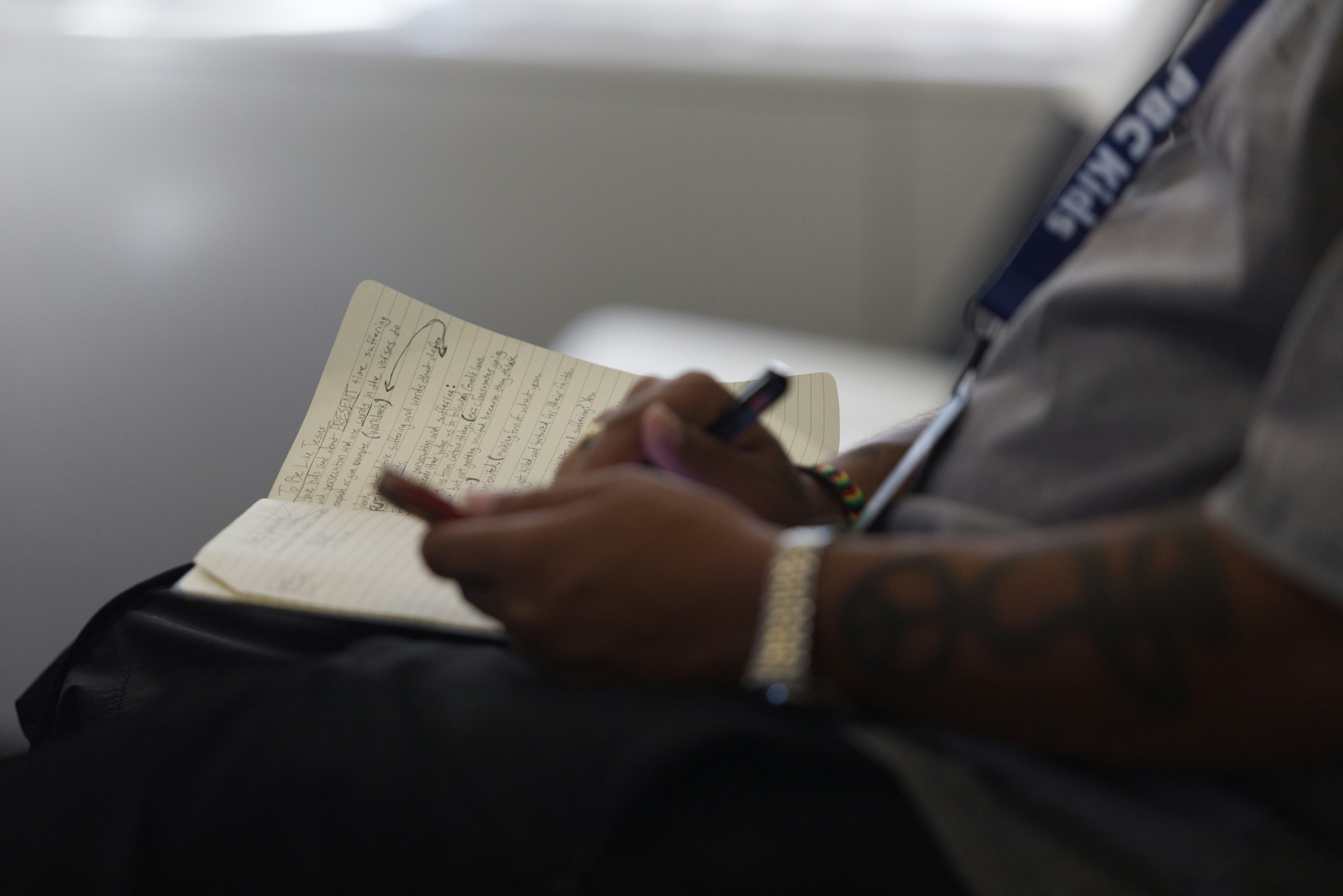 Notes in Hand: A Quiet Moment of Focus