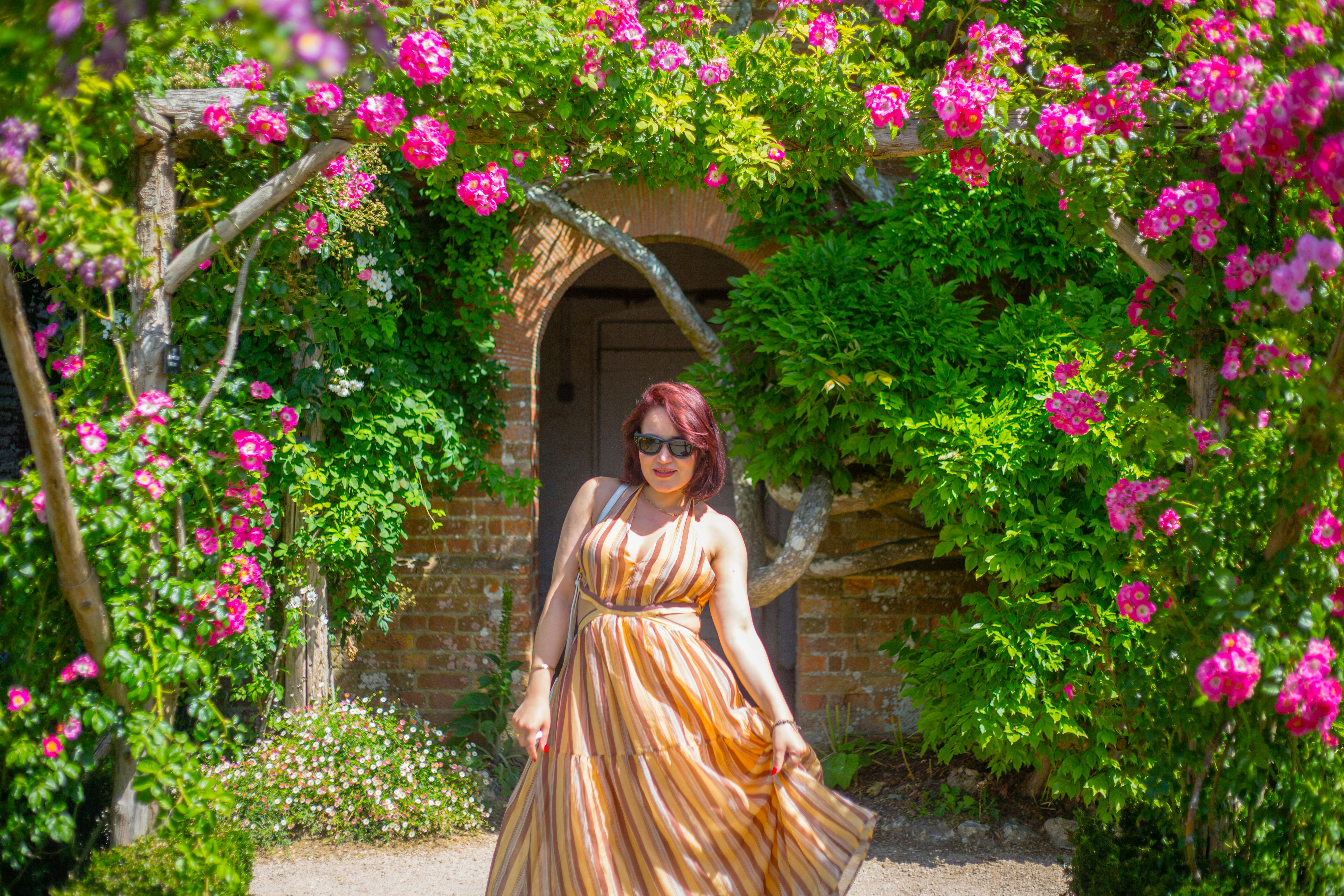 Sunlit Garden Dress: A Portrait Amid Bougainvillea Courtyard