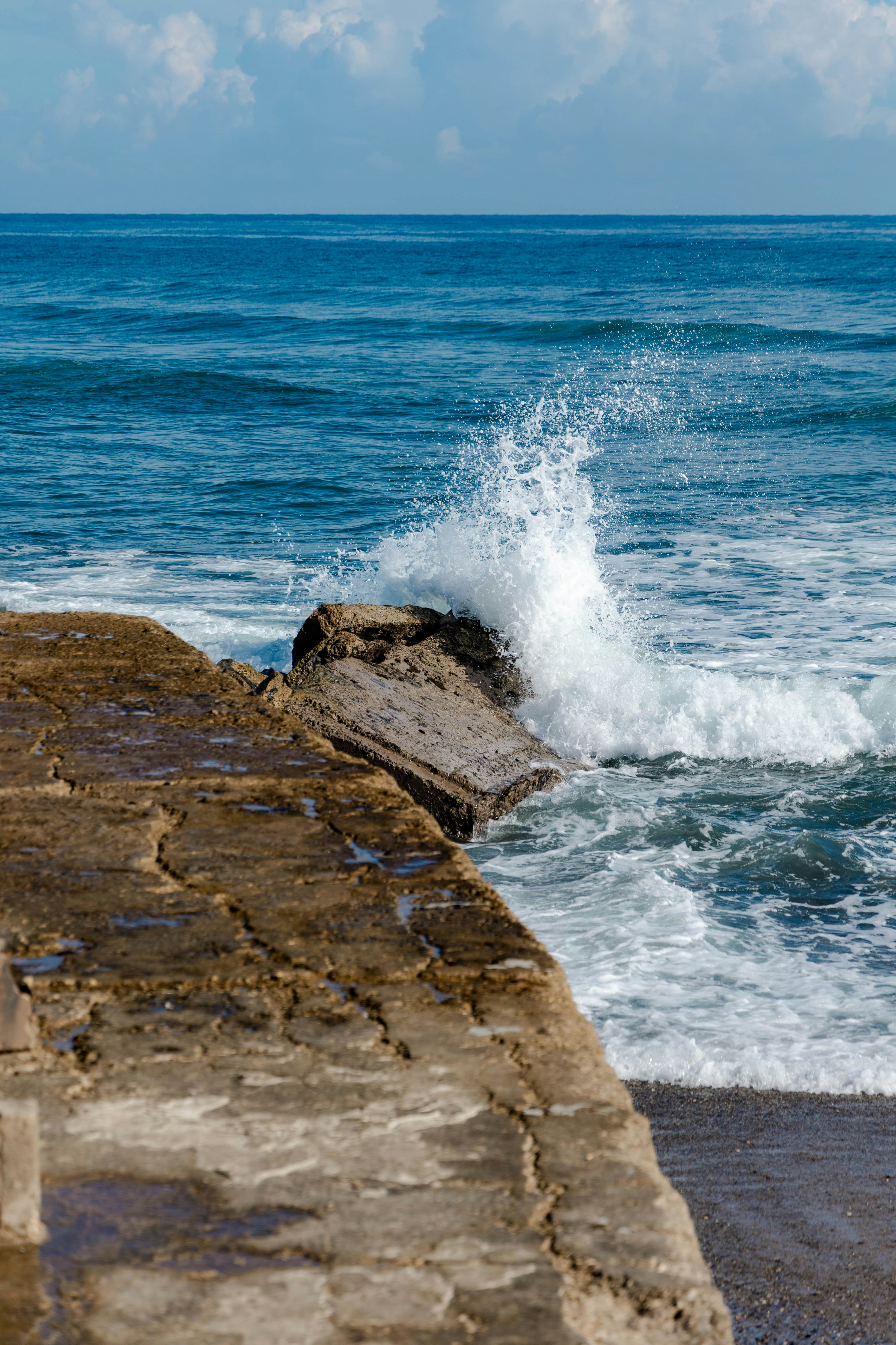 Rogue Wave at the Jetty: A Bite of Sea Spray