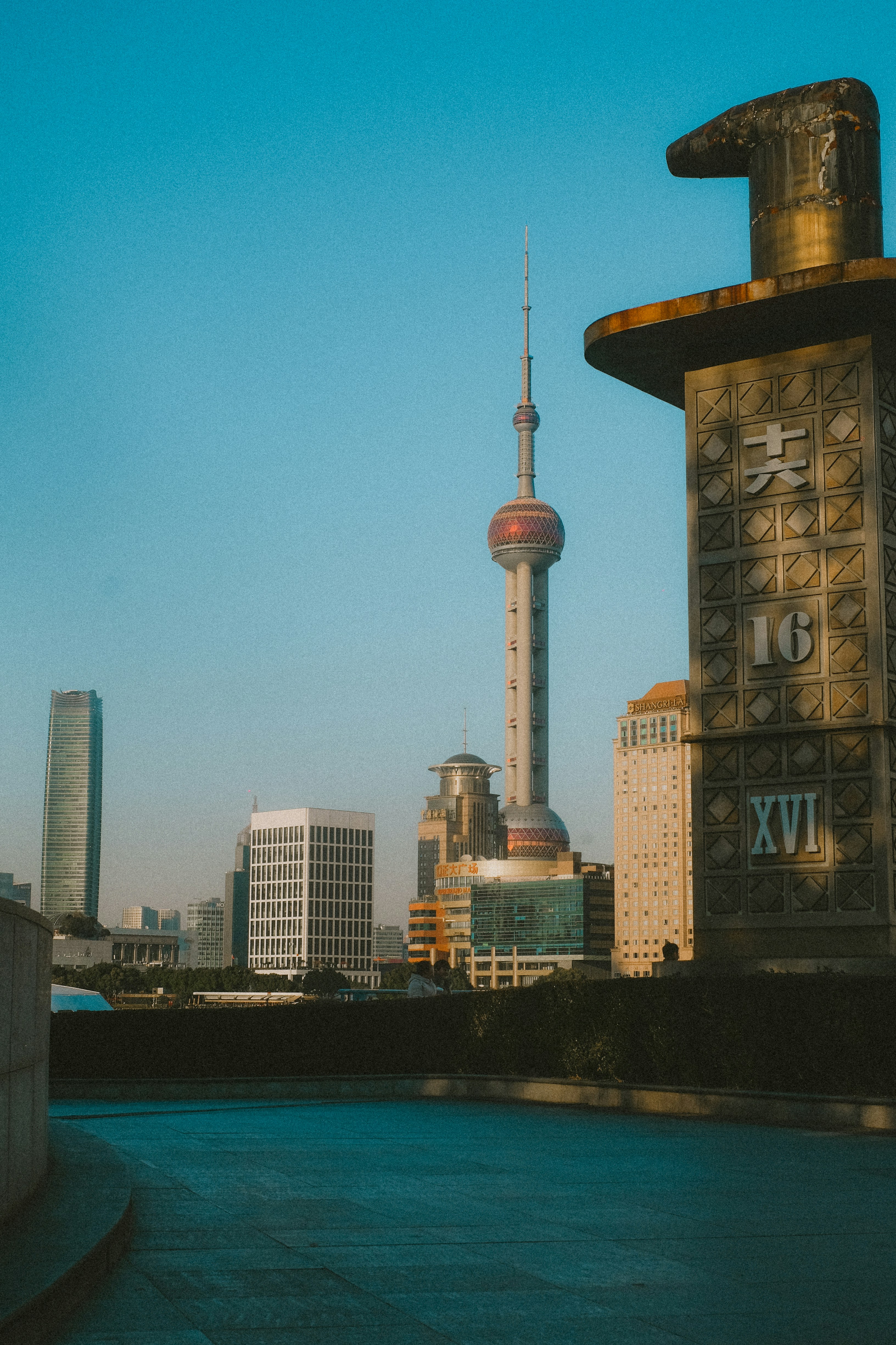 Urban Cone of Time: Shanghai Skyline with Monumental Clocktower