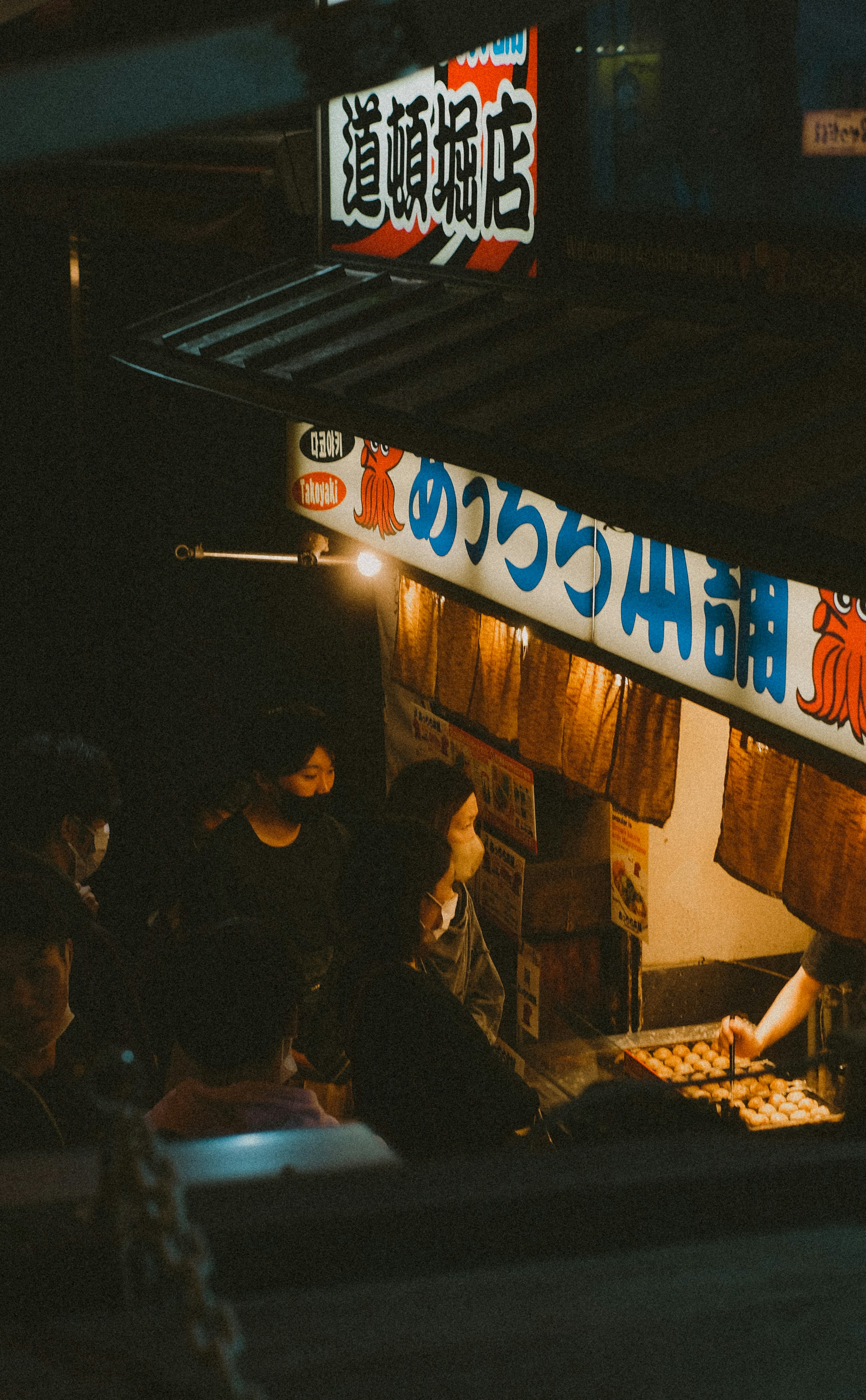 Warm Glow Over a Night Market Skewers Stall