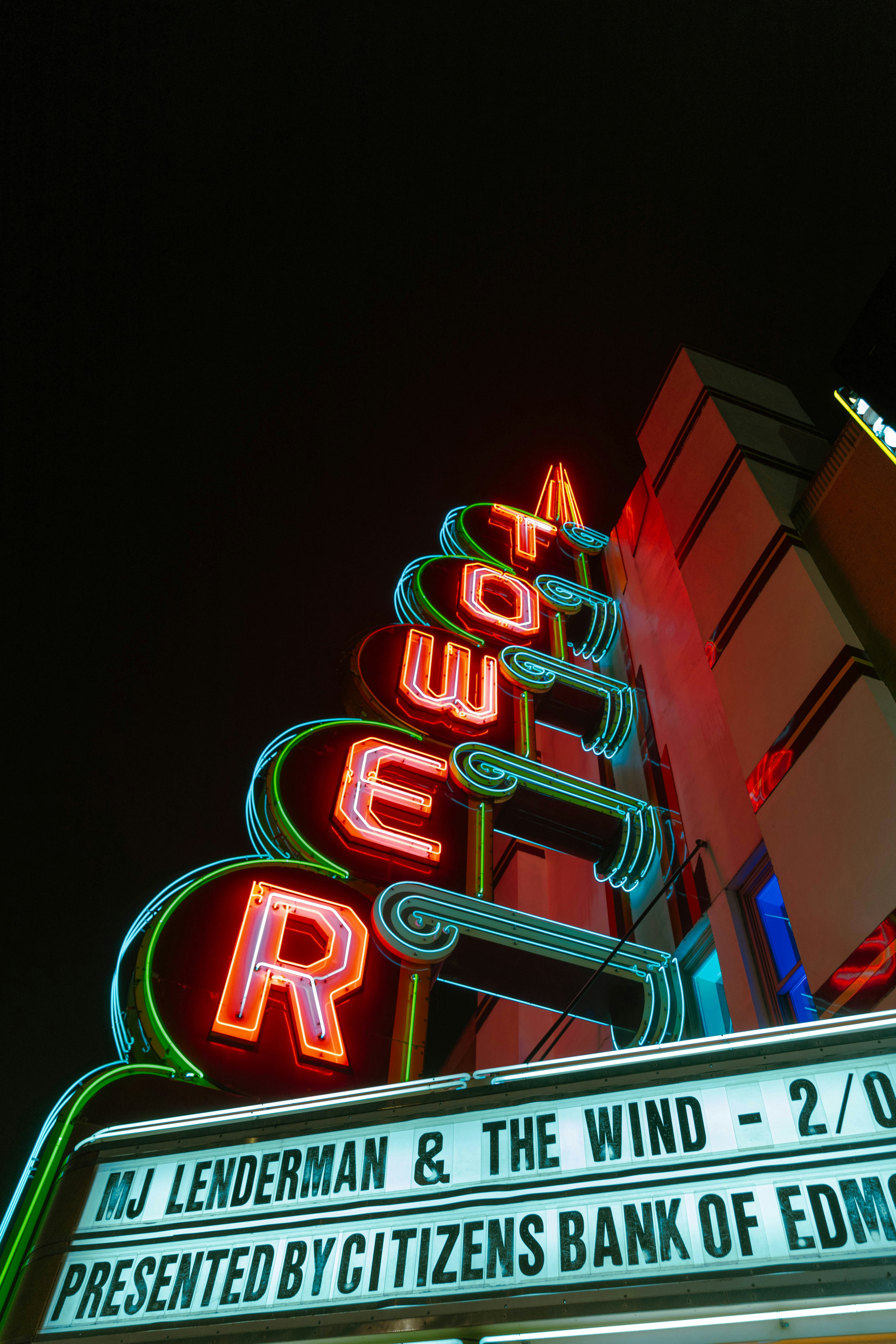 Neon Theater Sign Slices the Night sky