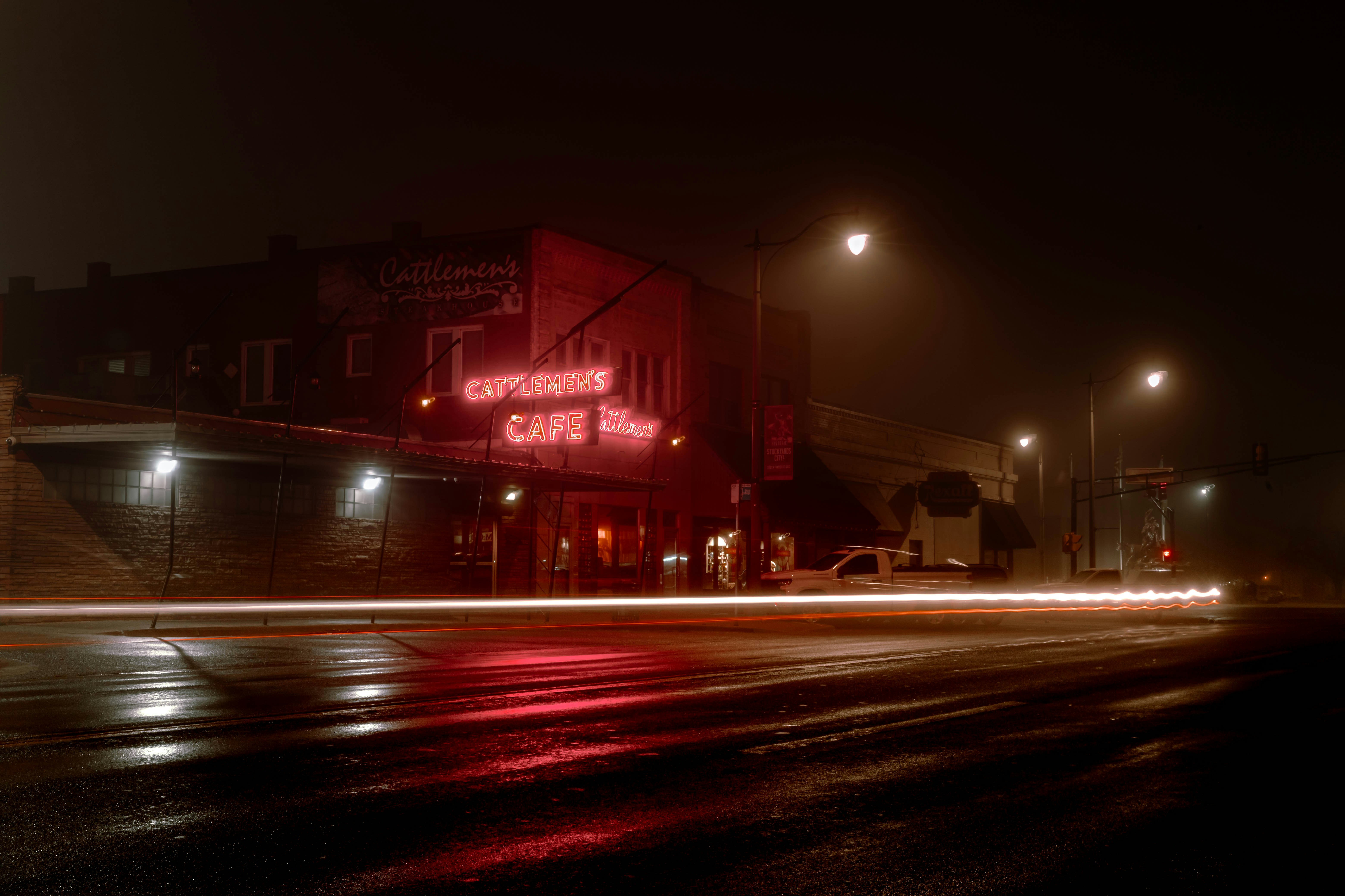 Neon Café on a Misty Street