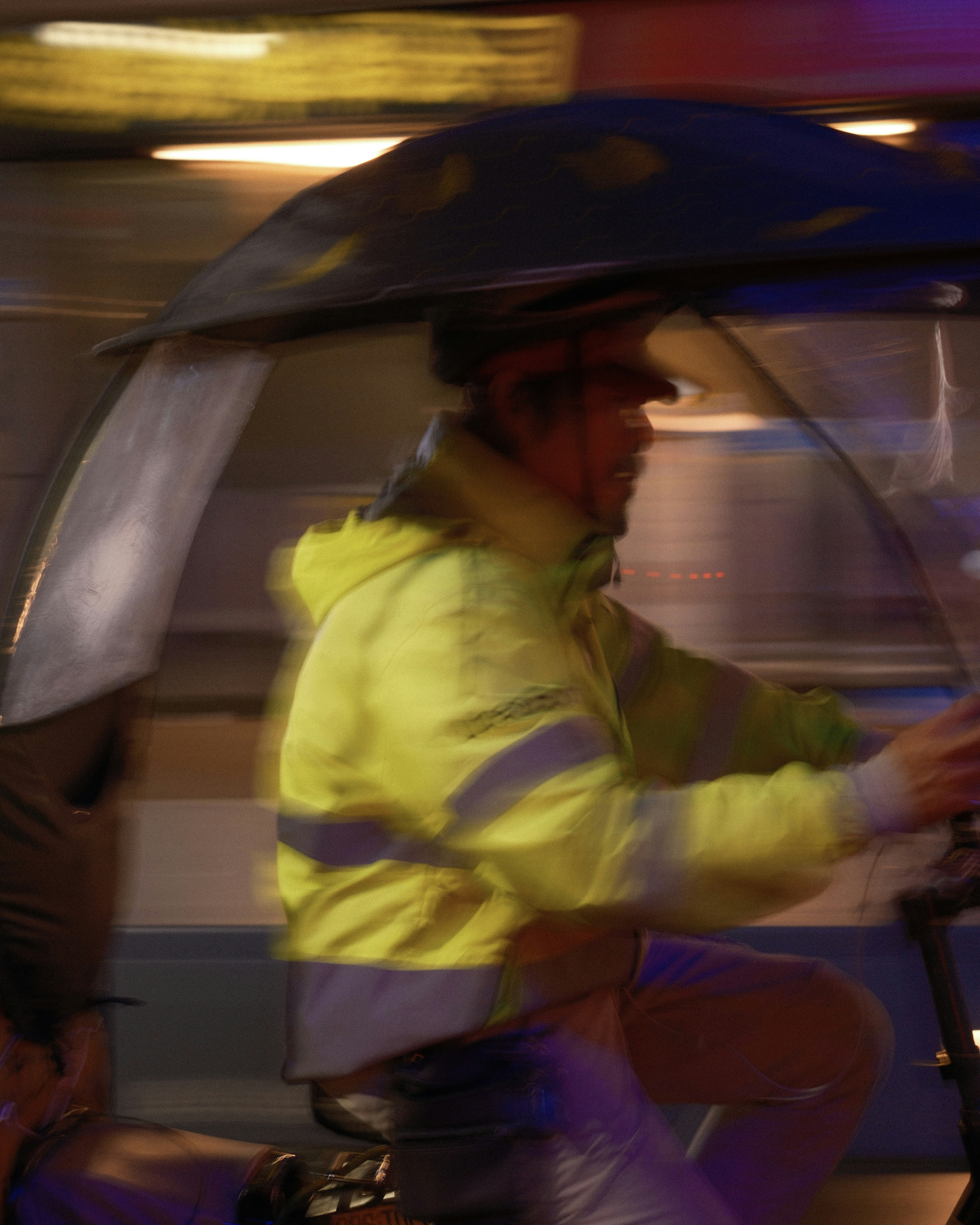 Blurry Motion, Bright Breath: A City Driver in Neon Wind
