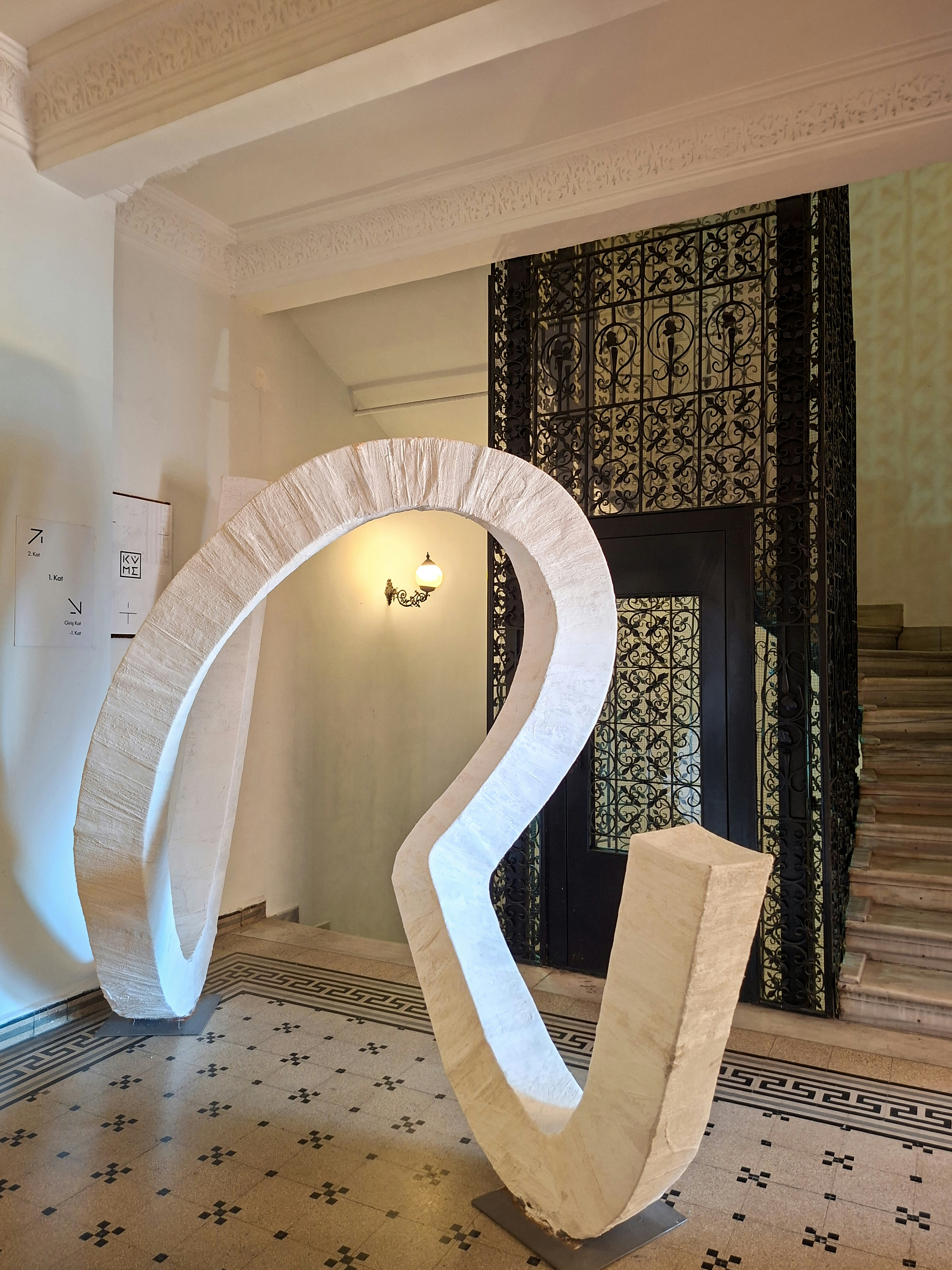 Curved Marble Ribbon Ascending the Gallery
