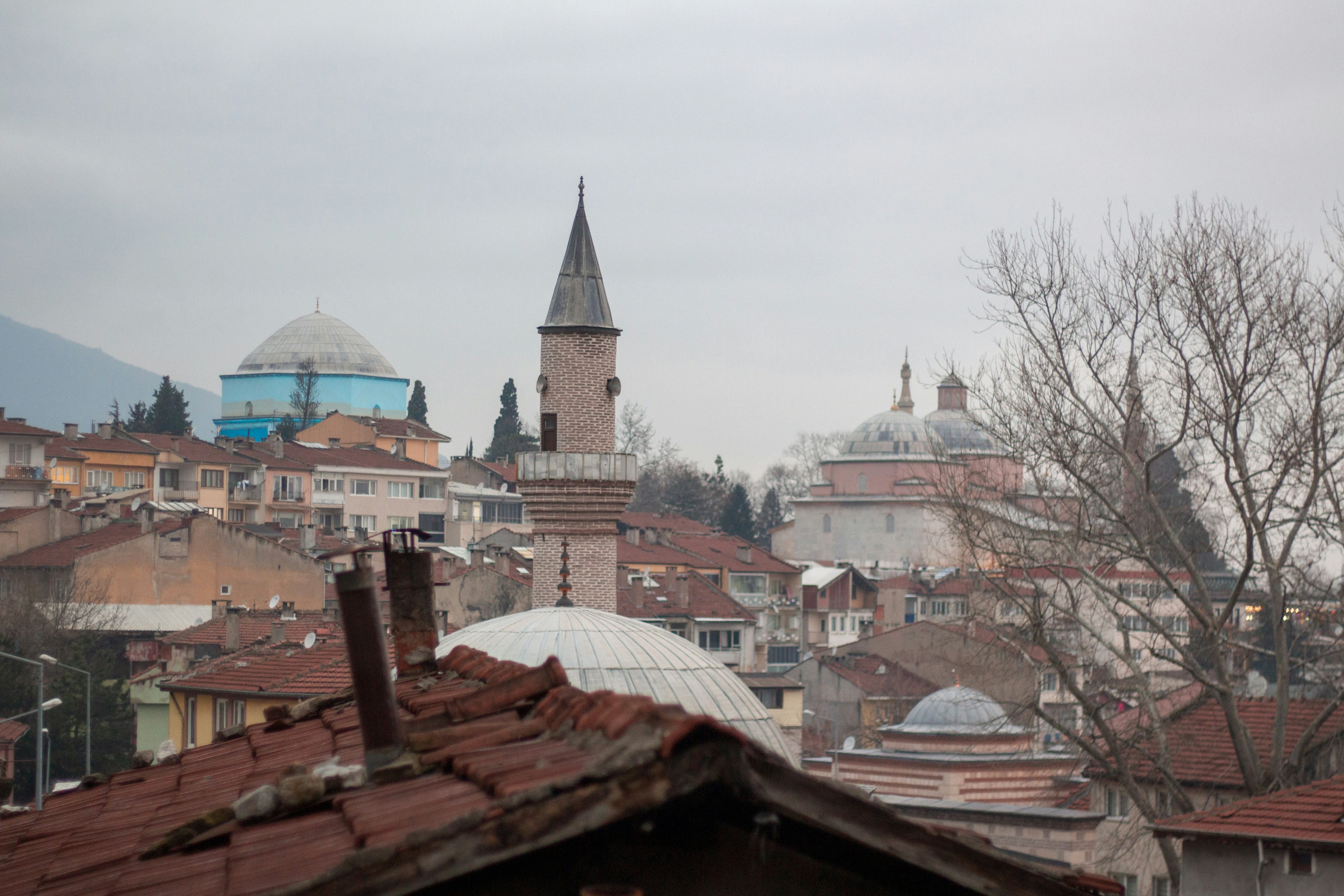 Rooftop Haze Over a Historic Quarter