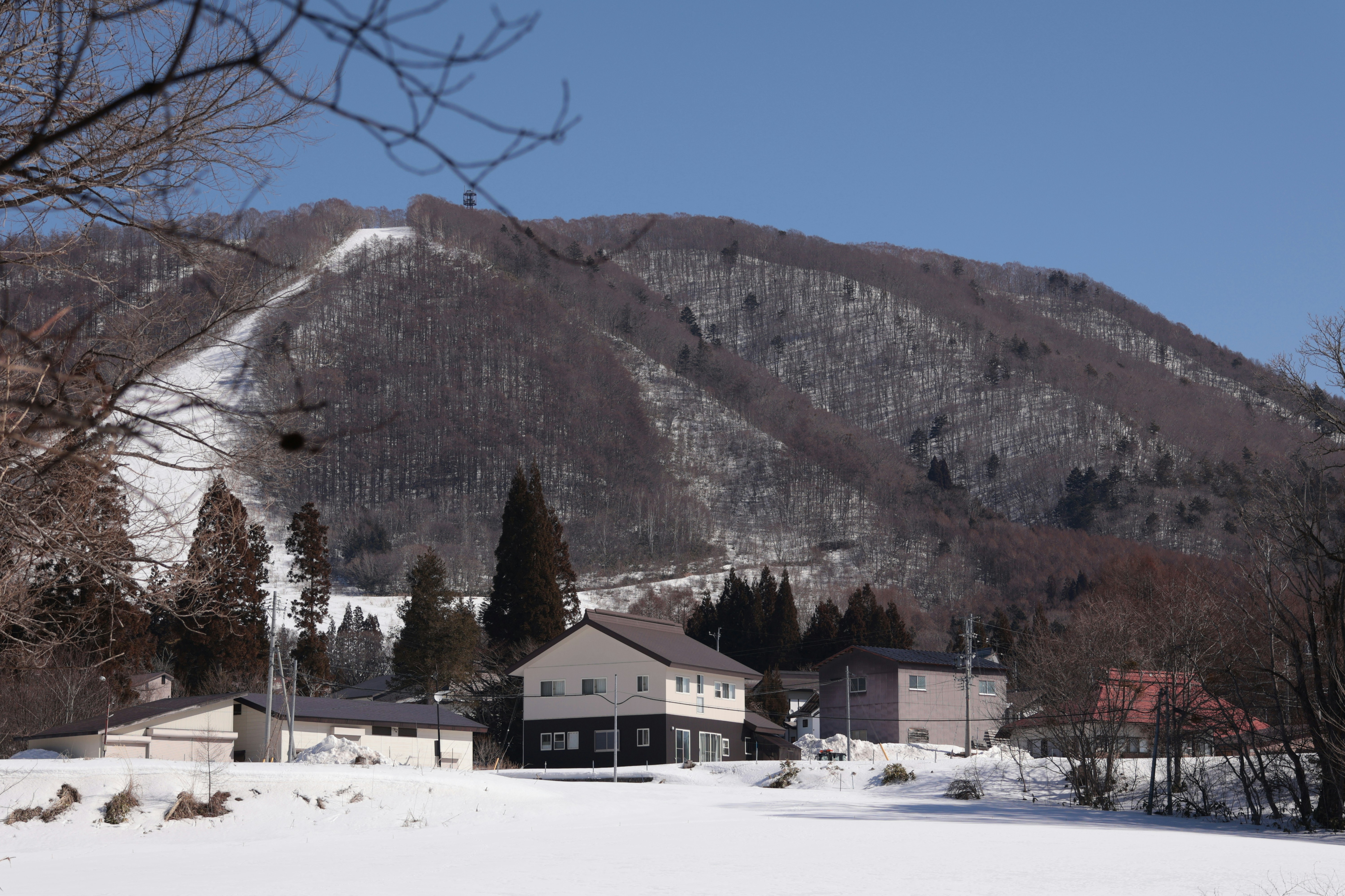 Snowbound Village at the Base of Quiet Hills