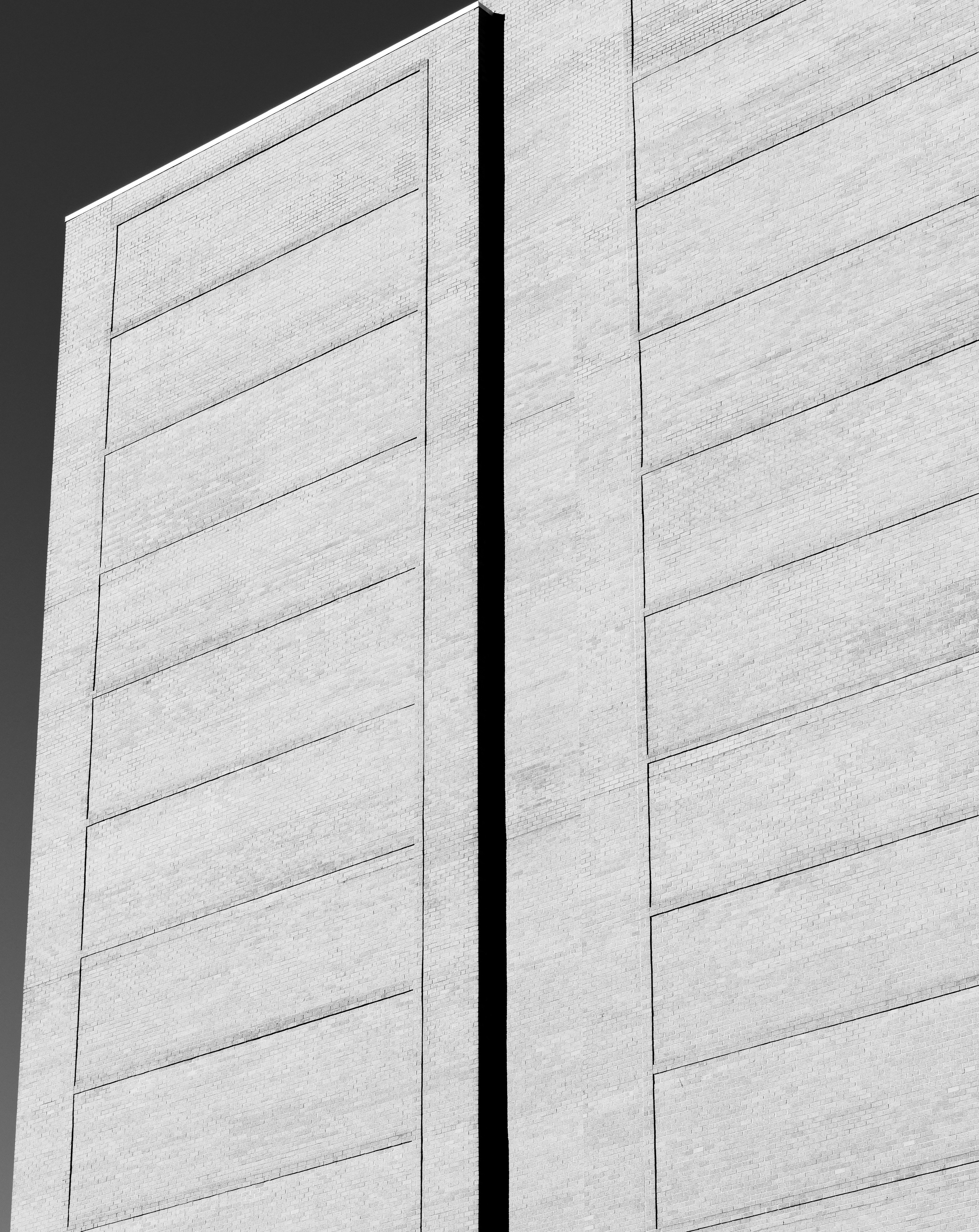 Vertical Split: Abstract Facade Divided by a Dramatic Crease