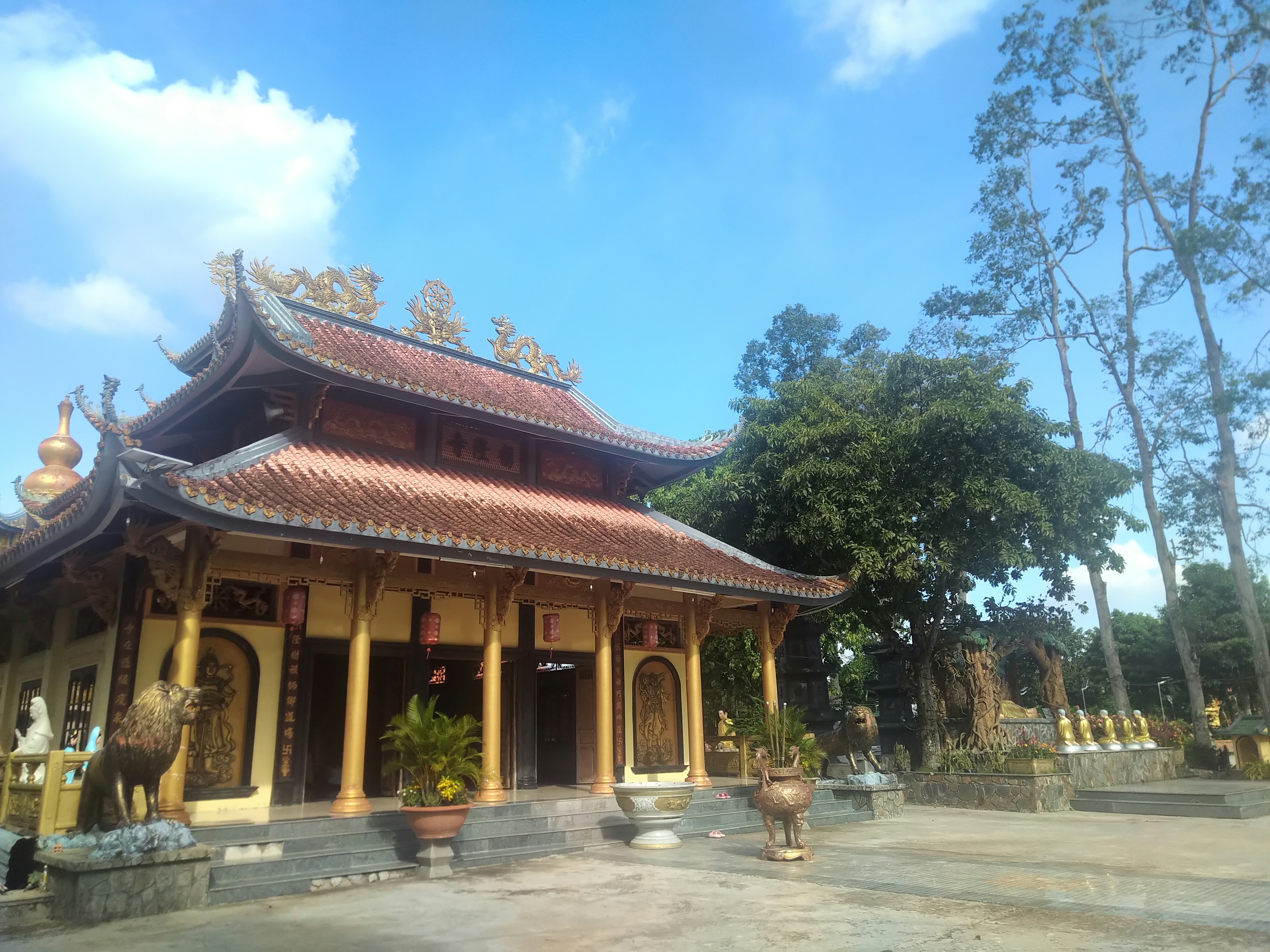Golden Temple Courtyard Under a Bright Sky