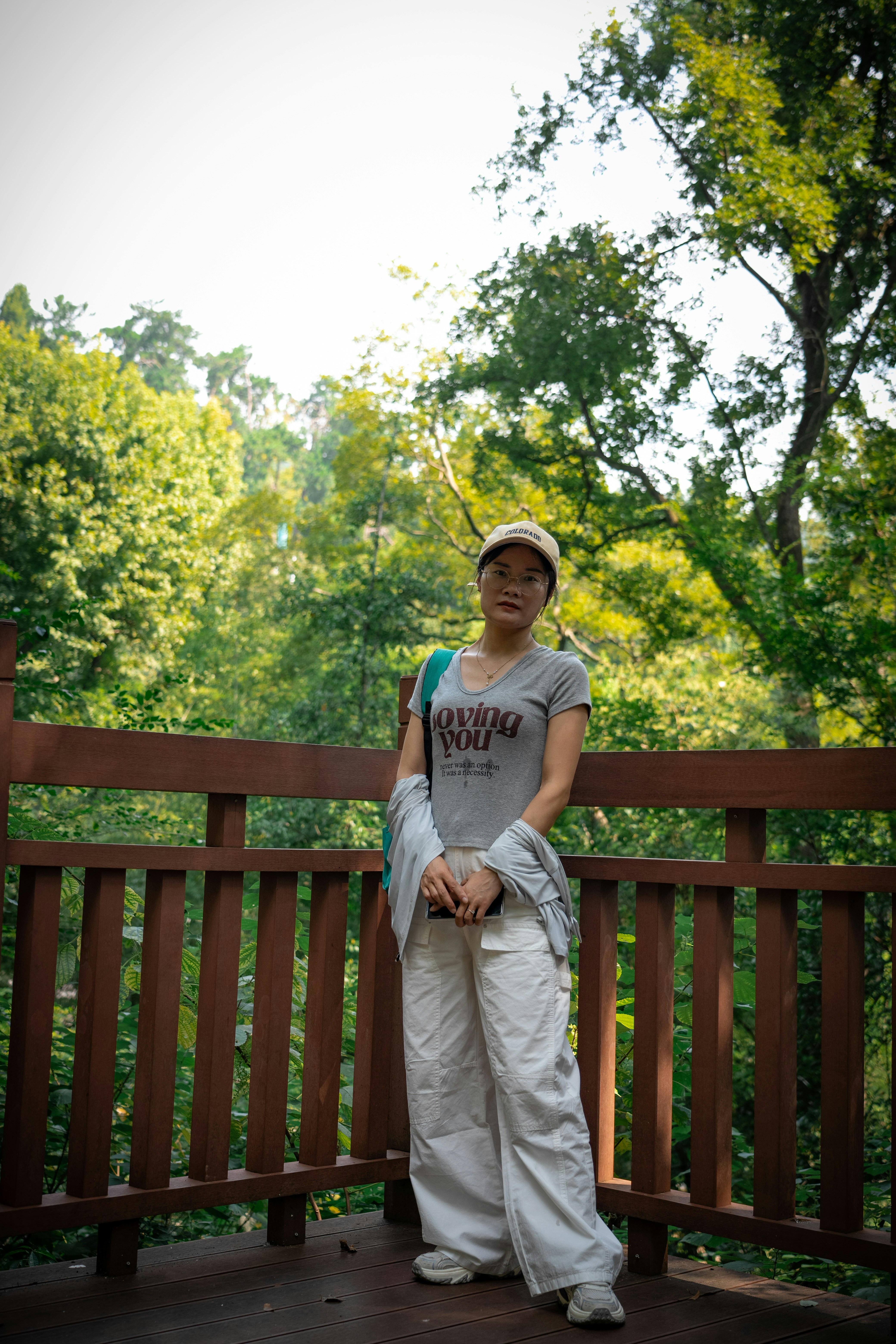 Casual Confidence on a Wooden Walkway