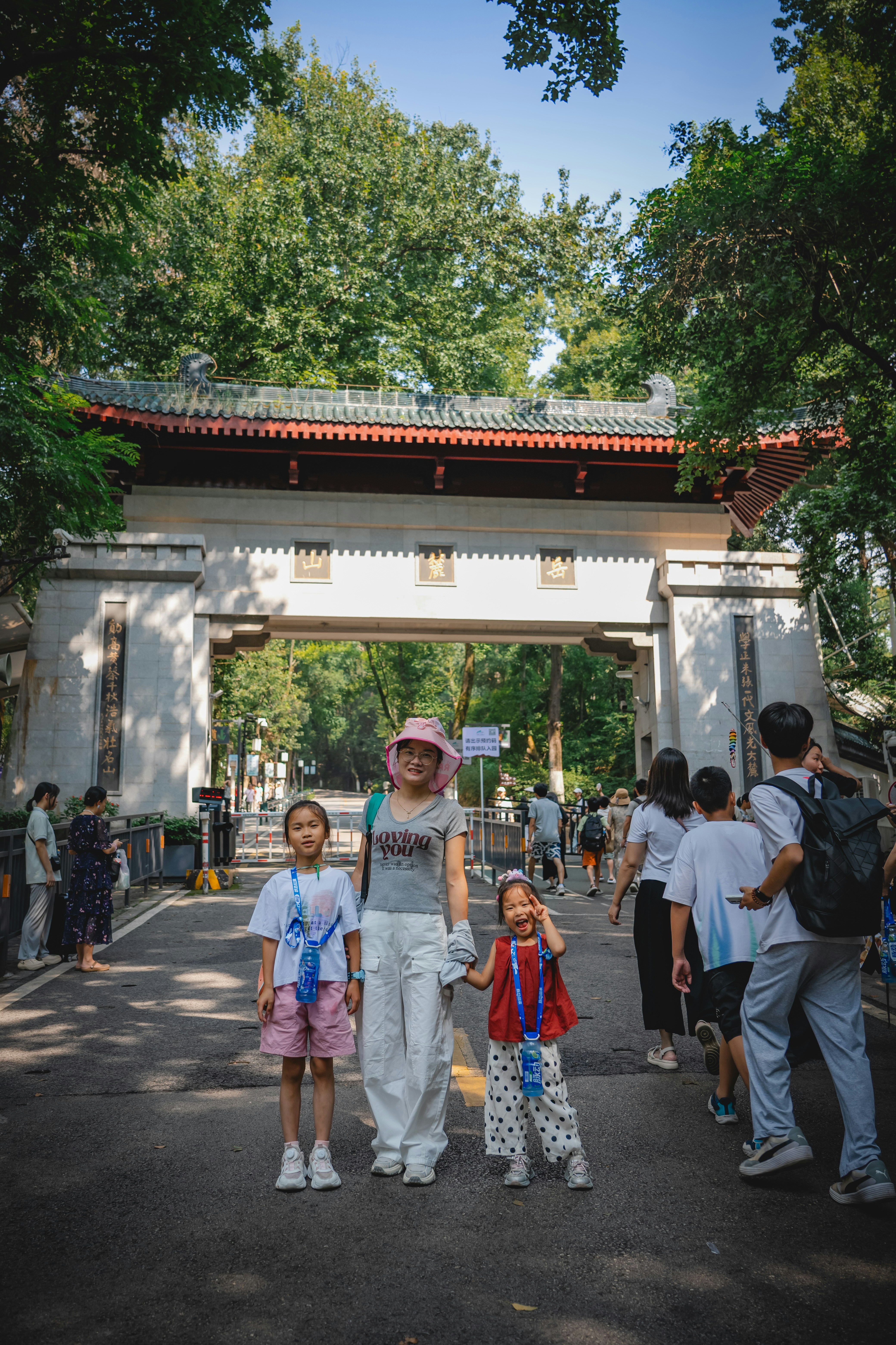 Family Portrait Beneath a Temple Gate