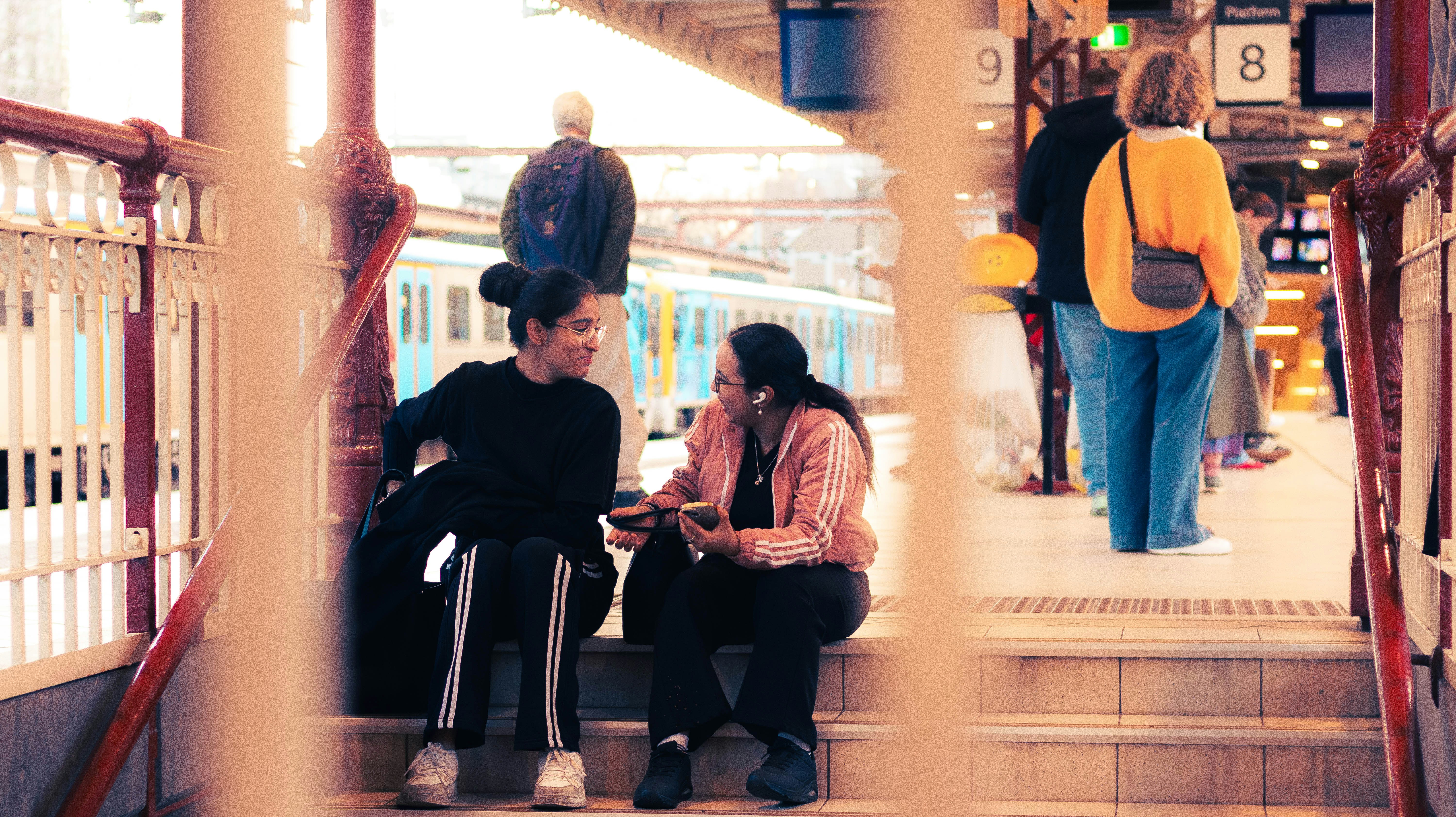 Conversations on the Platform: Friends Between the Railing