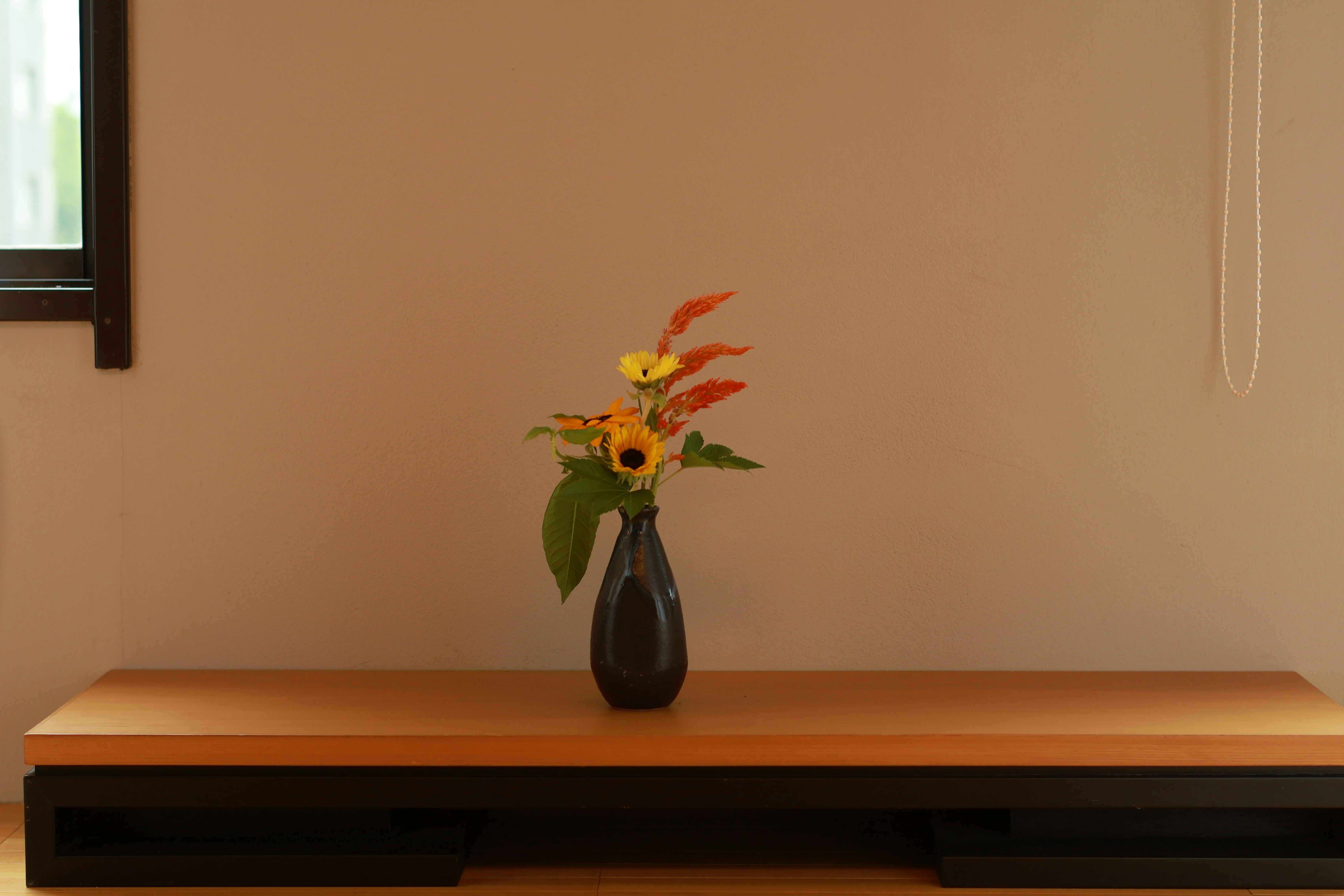 Minimal Still Life: Sunflower Vase on a Low Shelf