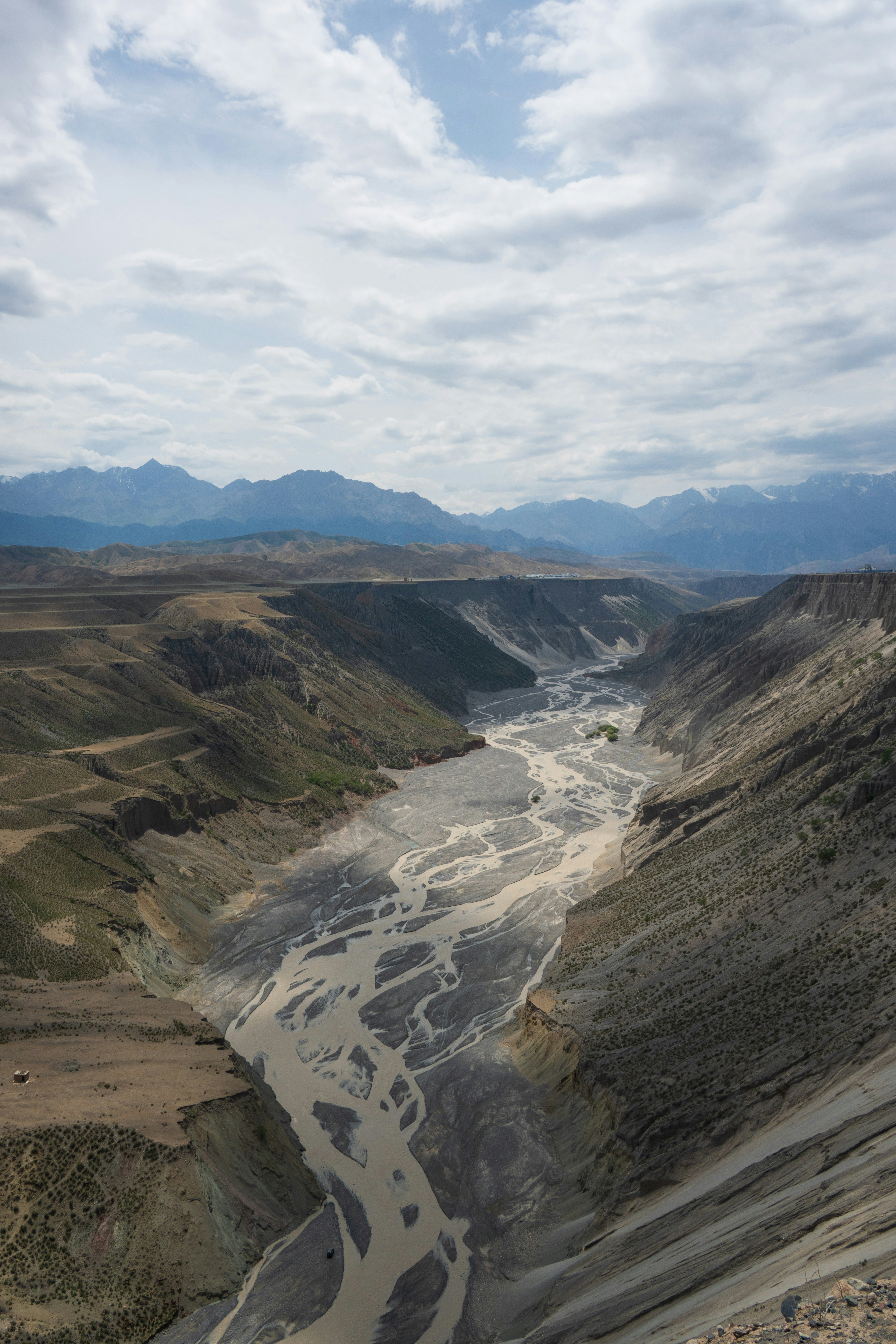 River Valley Echoes: A Winding Glacial Canyon Undersky Sky