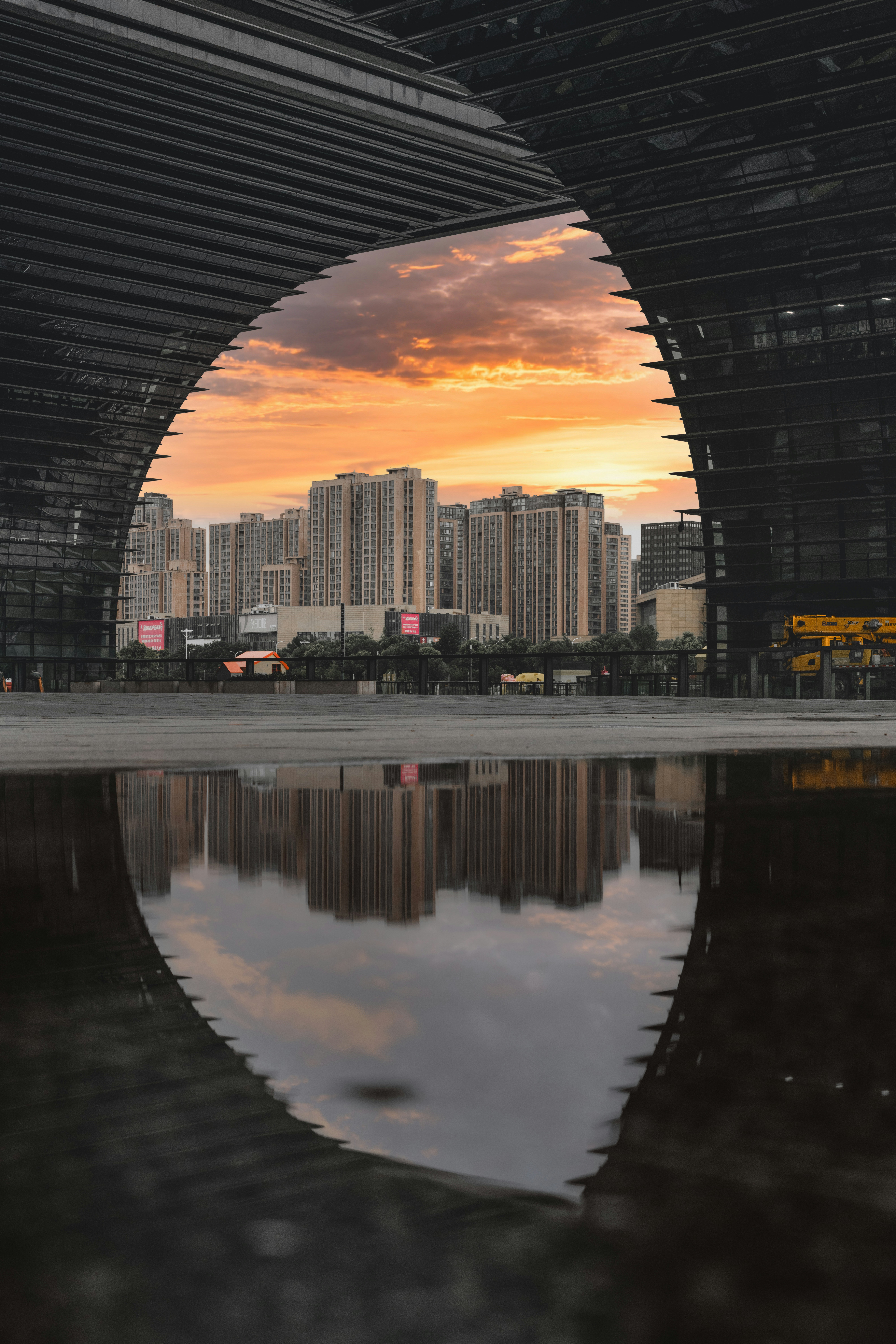 Framed Skyline: Echoes of a Sunset Through a Structural Arch