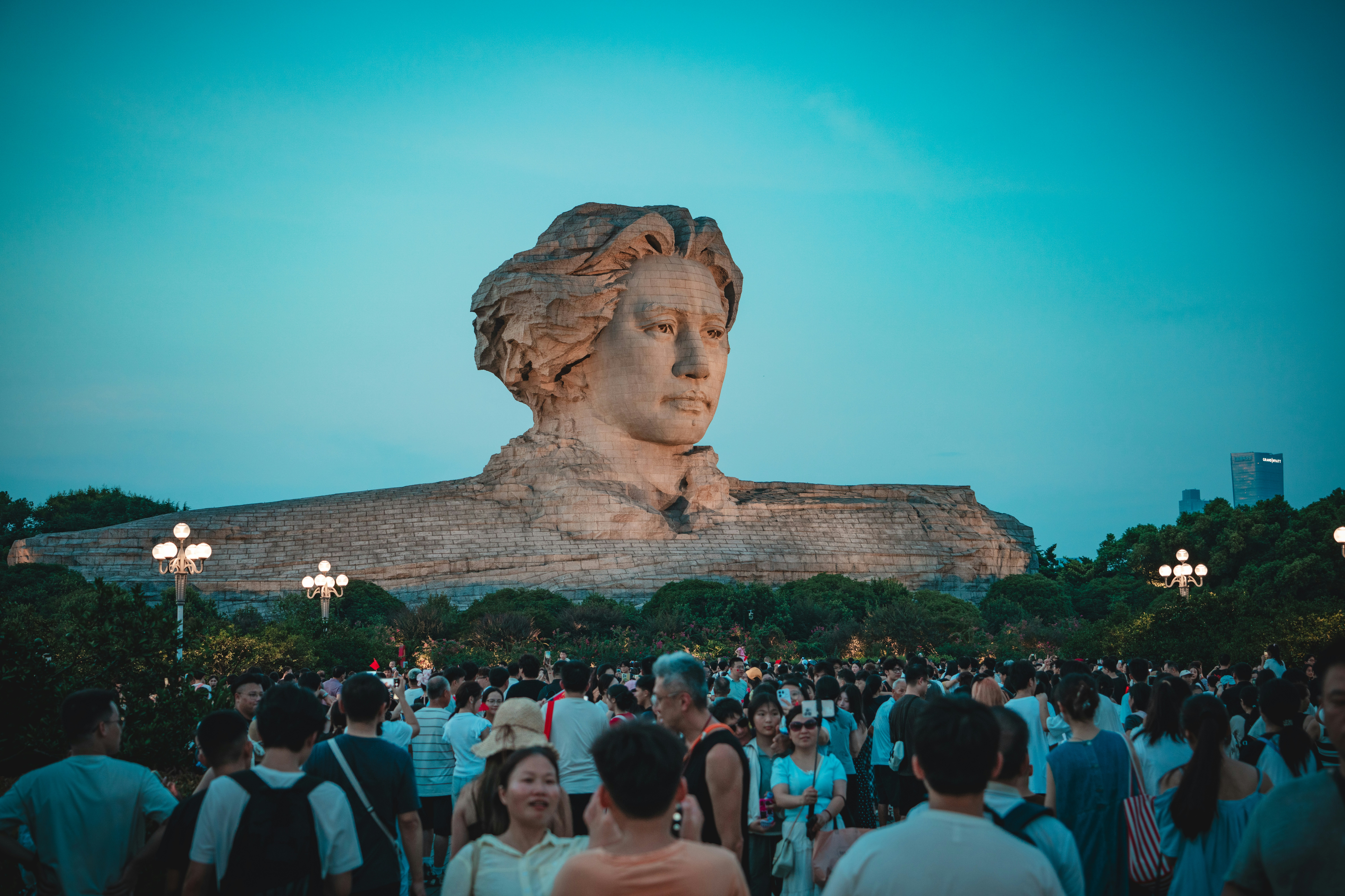 The People's Gaze Before a Stone Giant