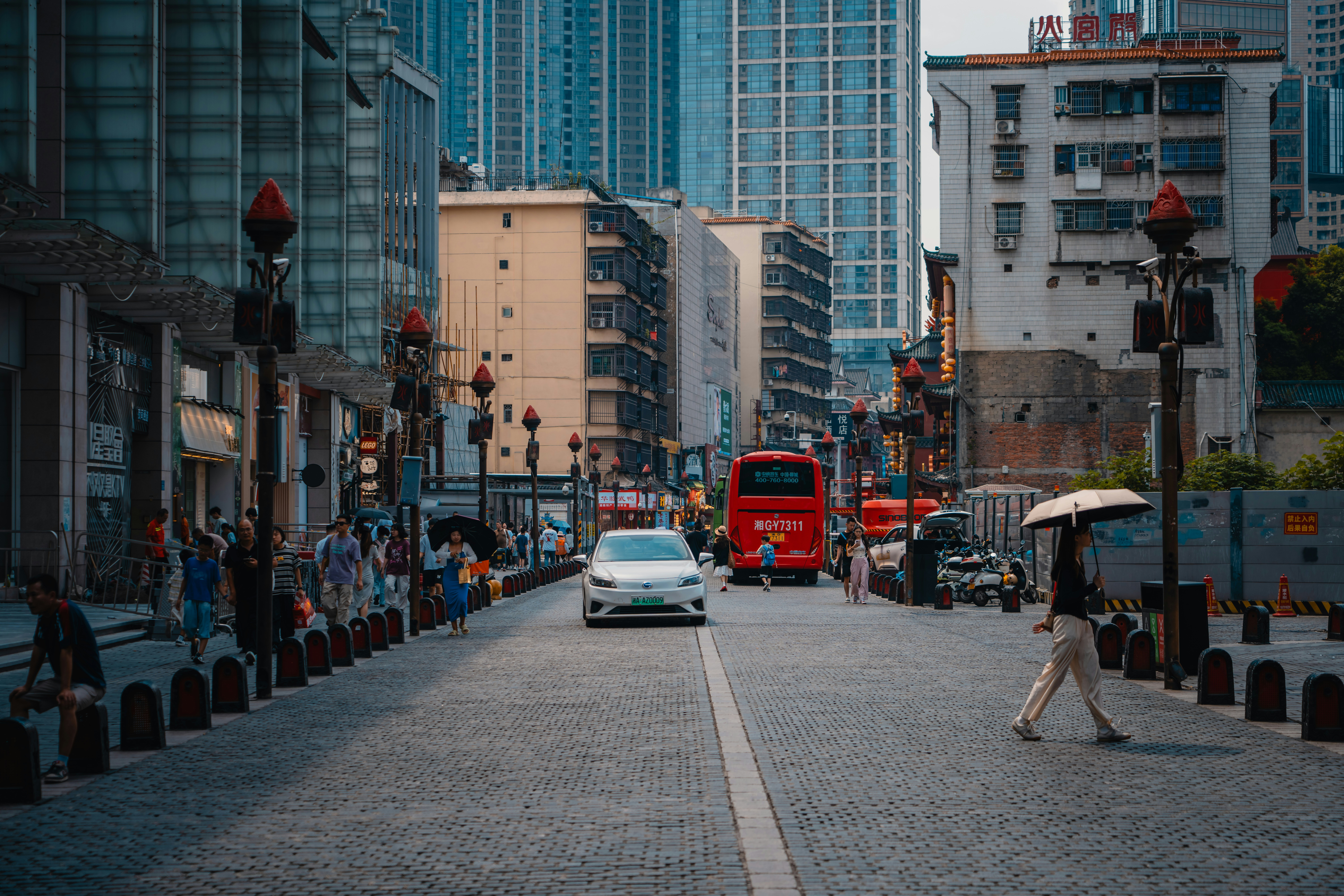 Urban Channel: A Quiet Street Carved by Transit