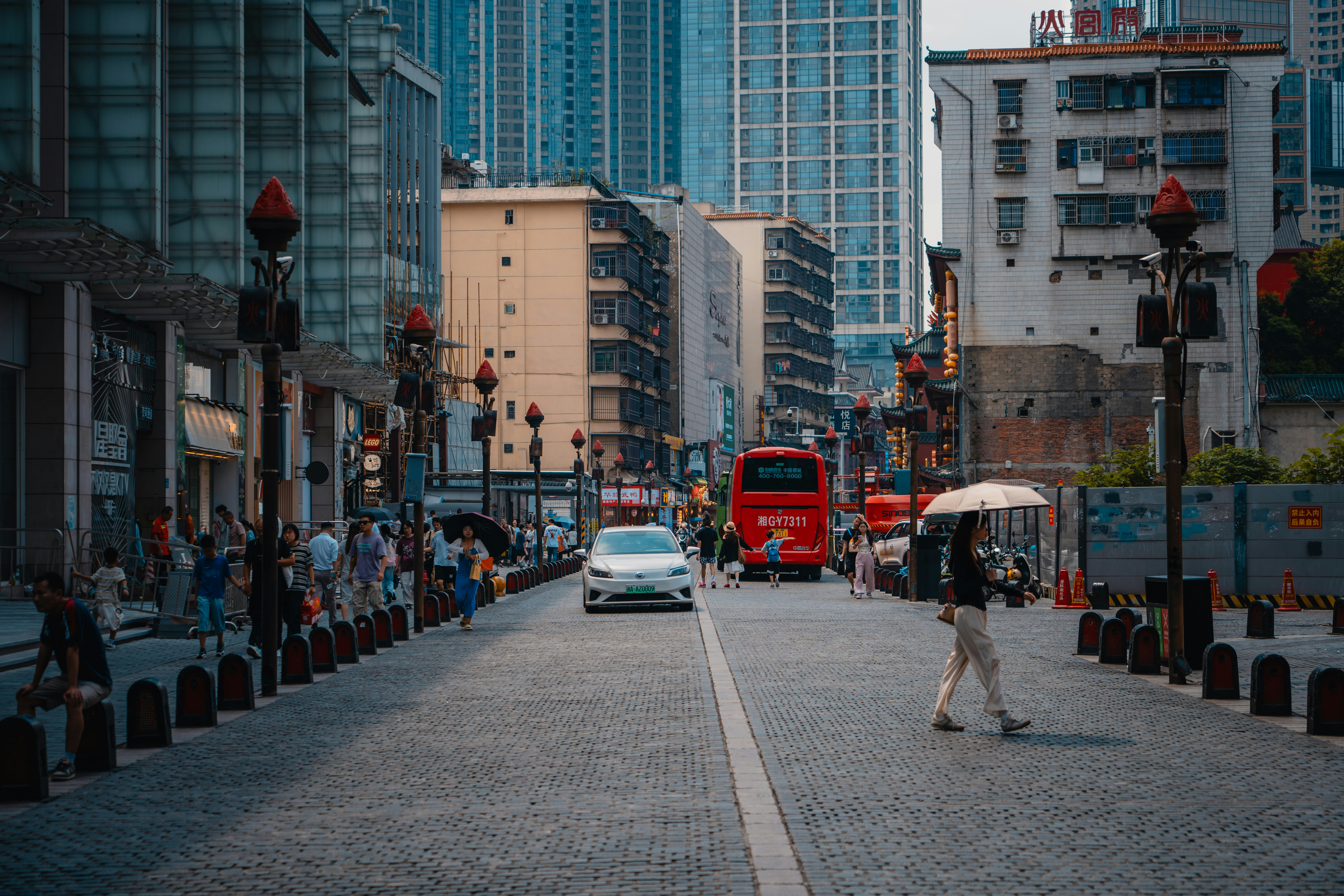Urban Boulevard: A Quiet Moment Amid City Transit