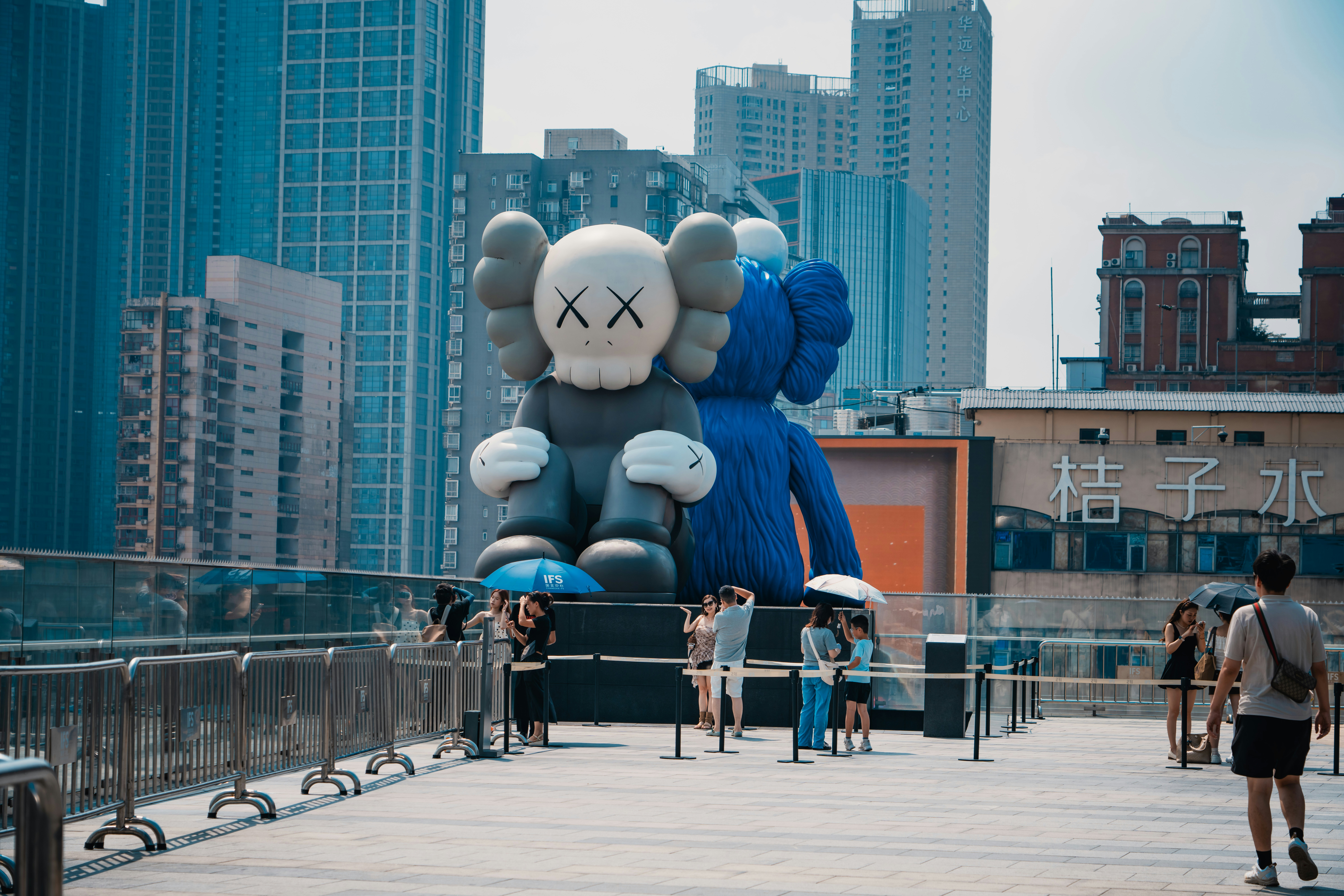 Urban Playground: Giant Kaws-influenced Sculpture Surfaces Over the Riverfront