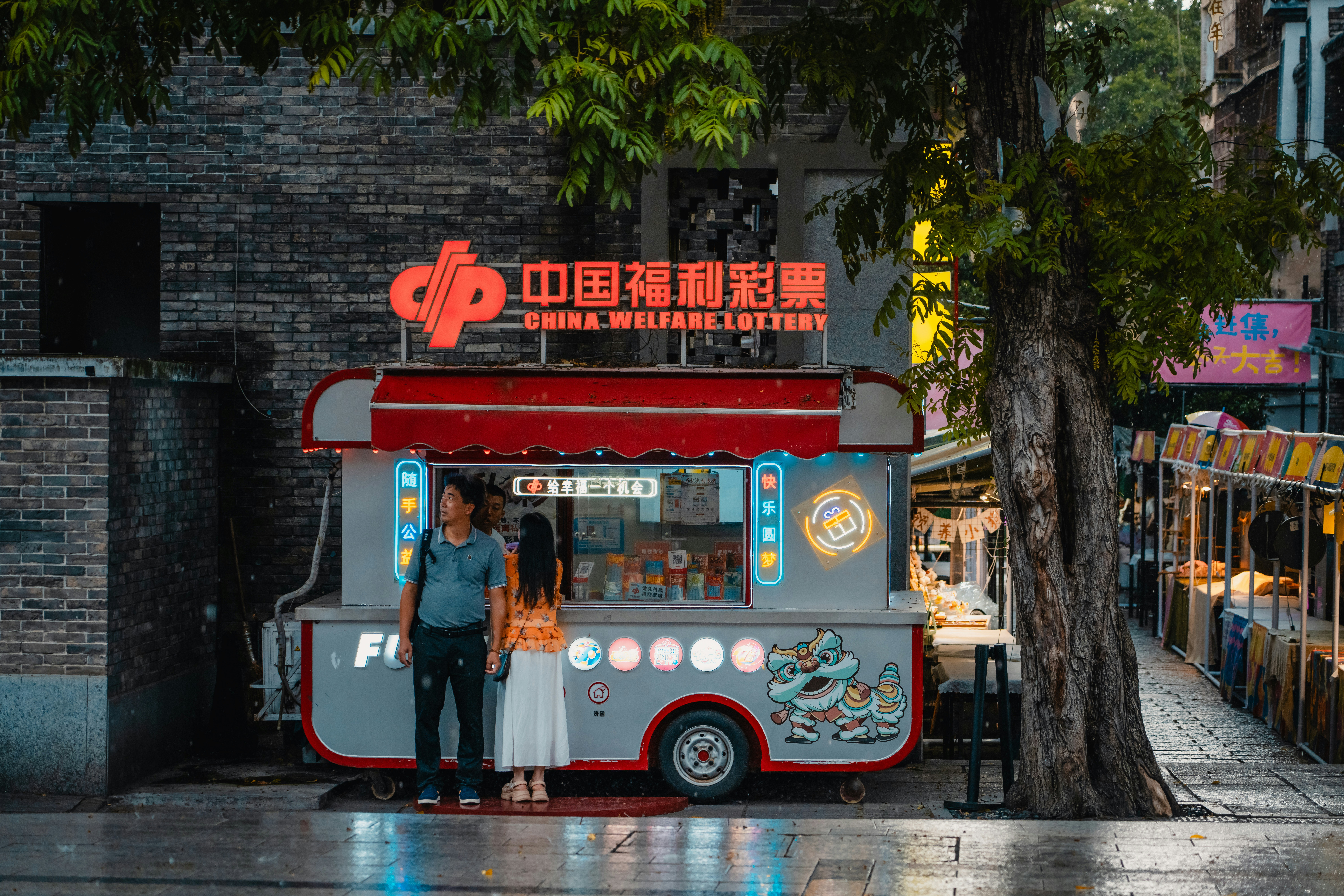 Food Truck Rendezvous Under Neon Signage