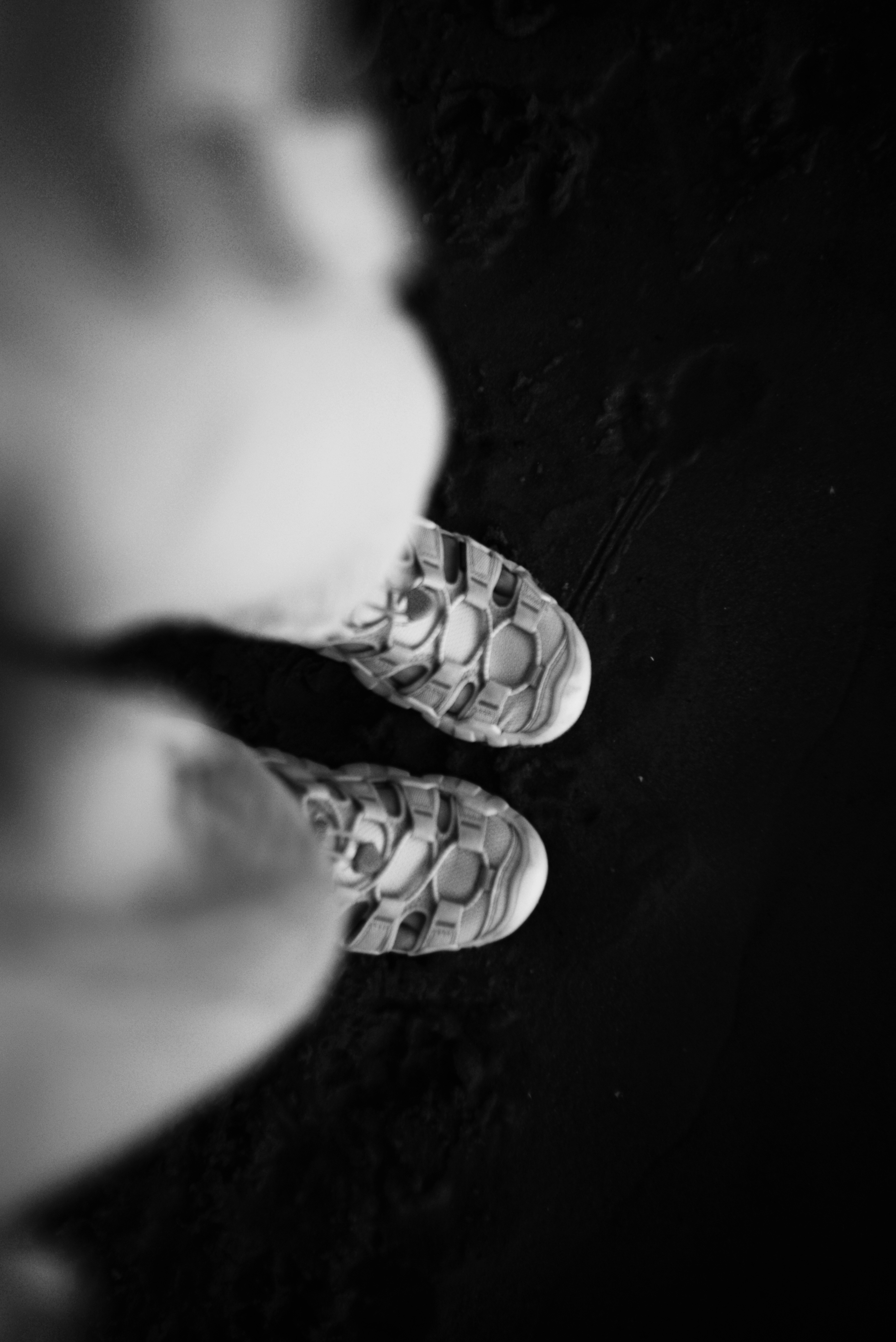 Footwear in Focus: A Quiet Descent into Darkness