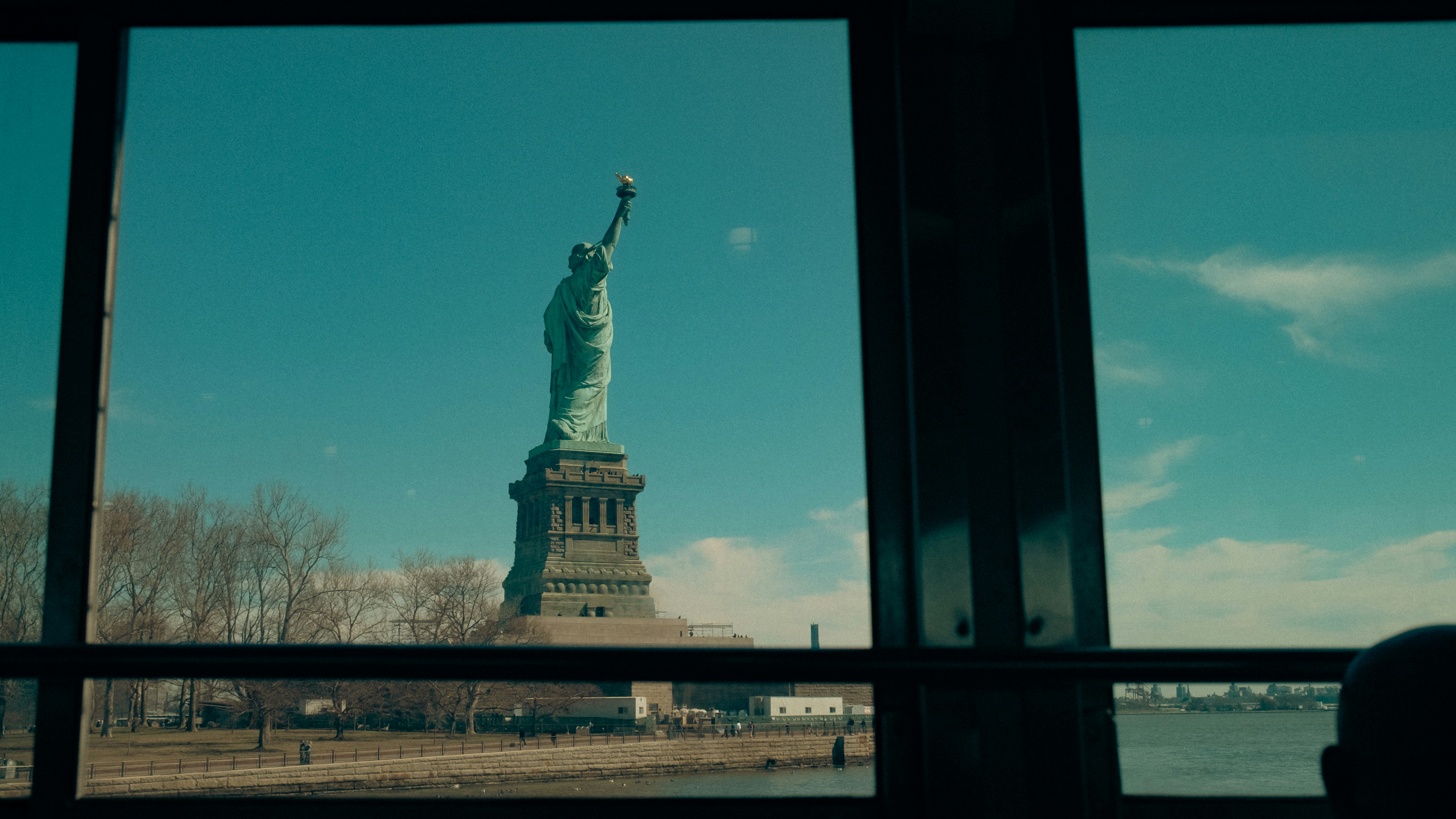 Statue of Liberty through a Wide-Framed Window