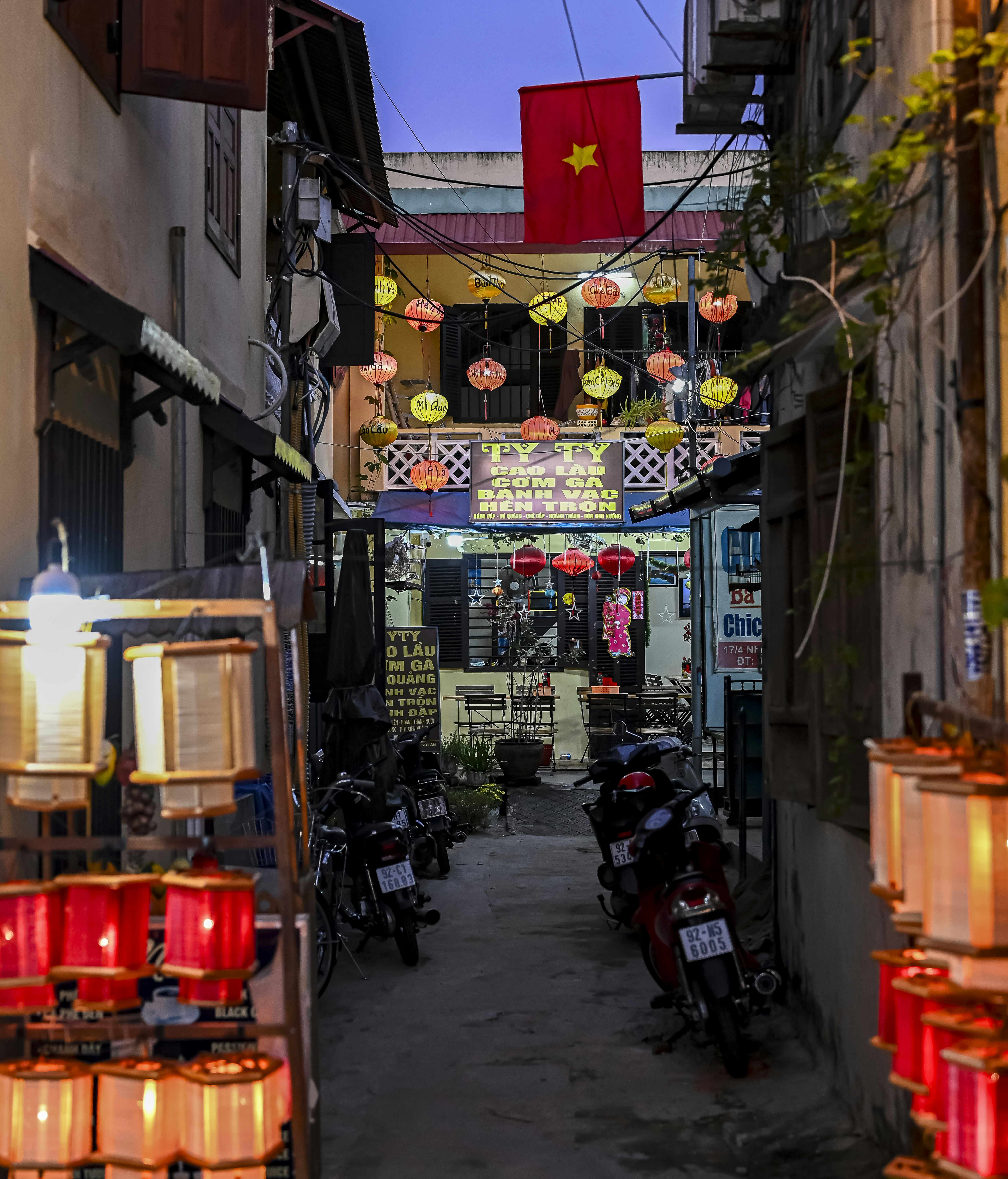 Lantern-lit Alleyways beneath a Red Banner
