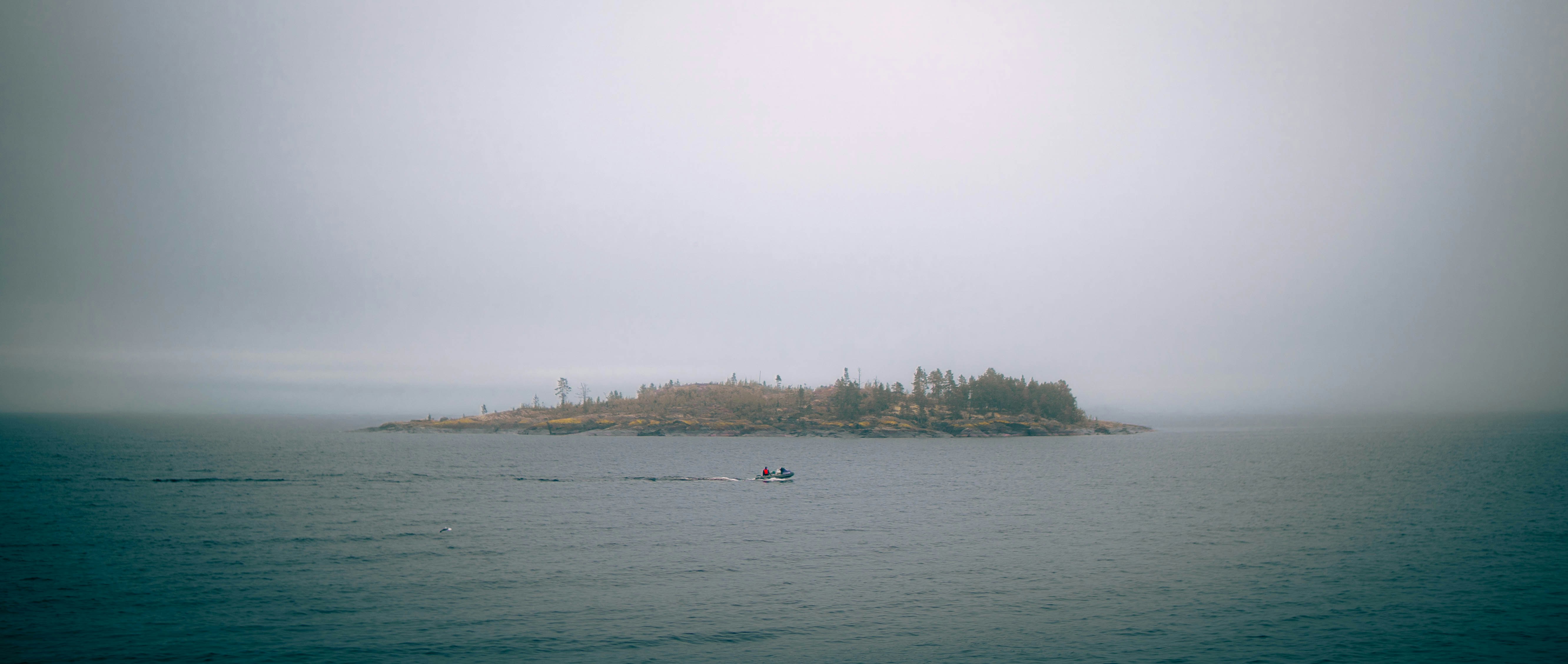 Distant Isle: A Quiet Sail toward the Mist
