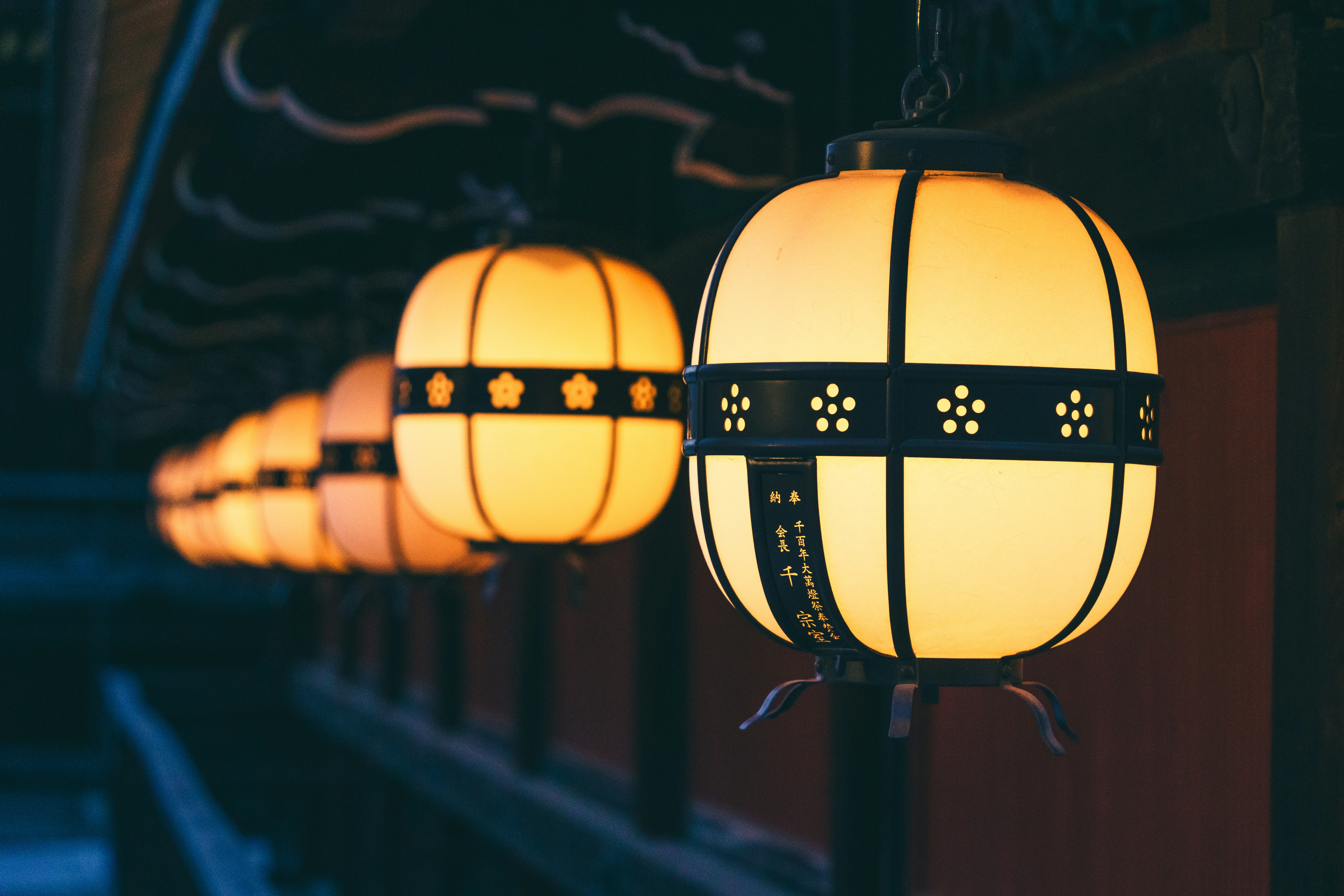 Row of Lanterns: Warm Glows in a Quiet Corridor