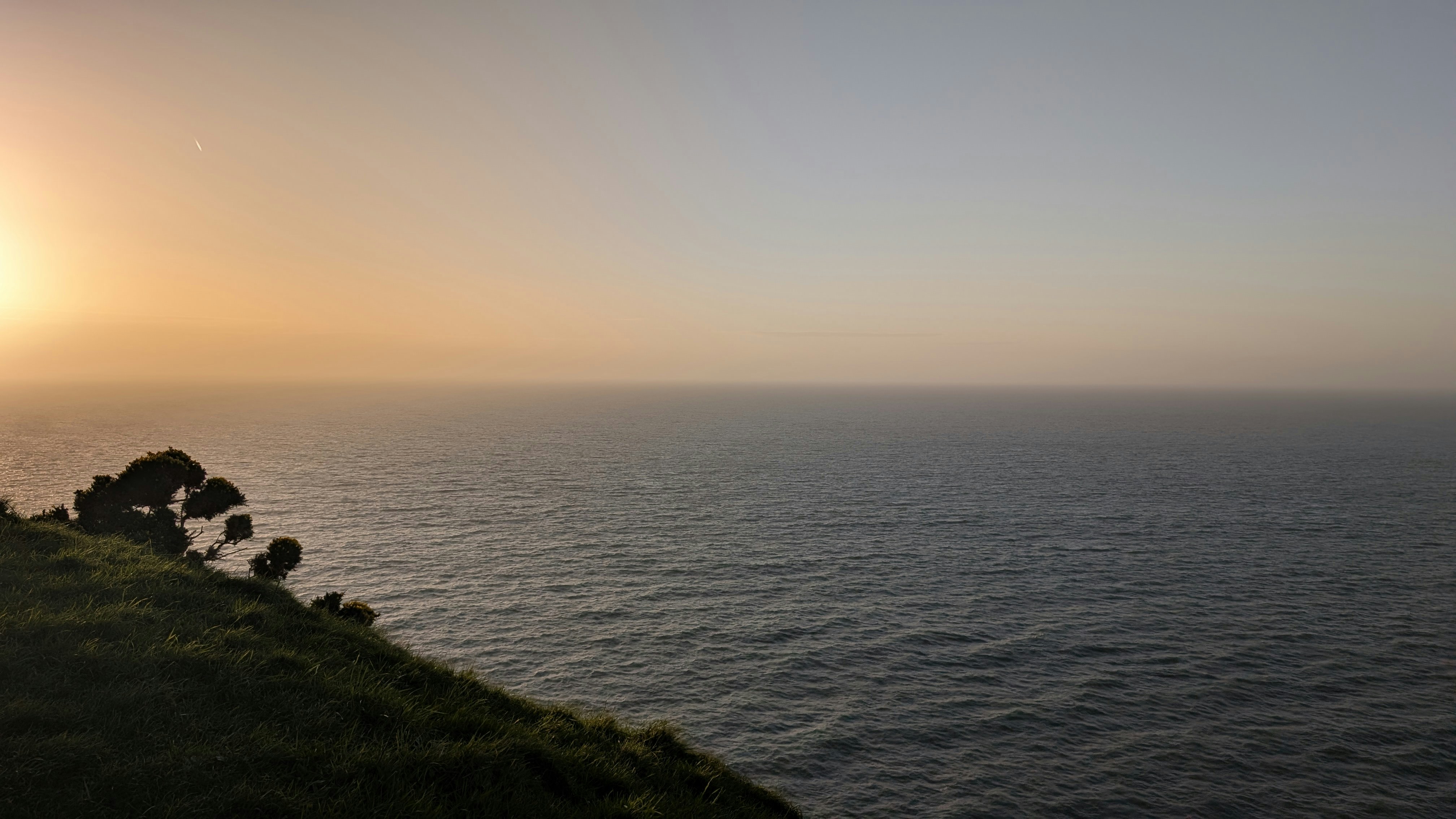 Sunlit Verge: Cliffside Horizon at Dusk