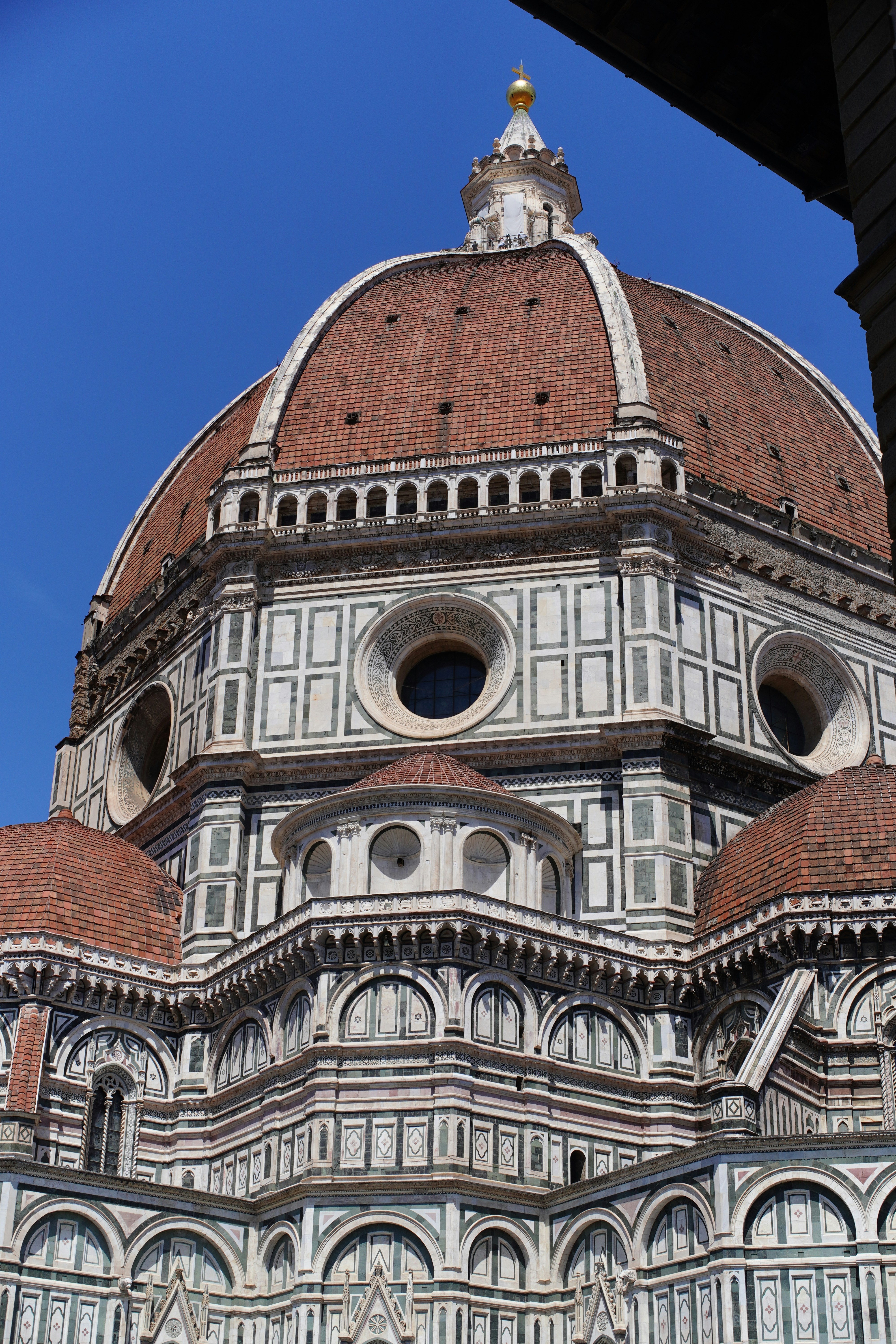 Dome Details and Marbled Facade of an Italian Cathedral