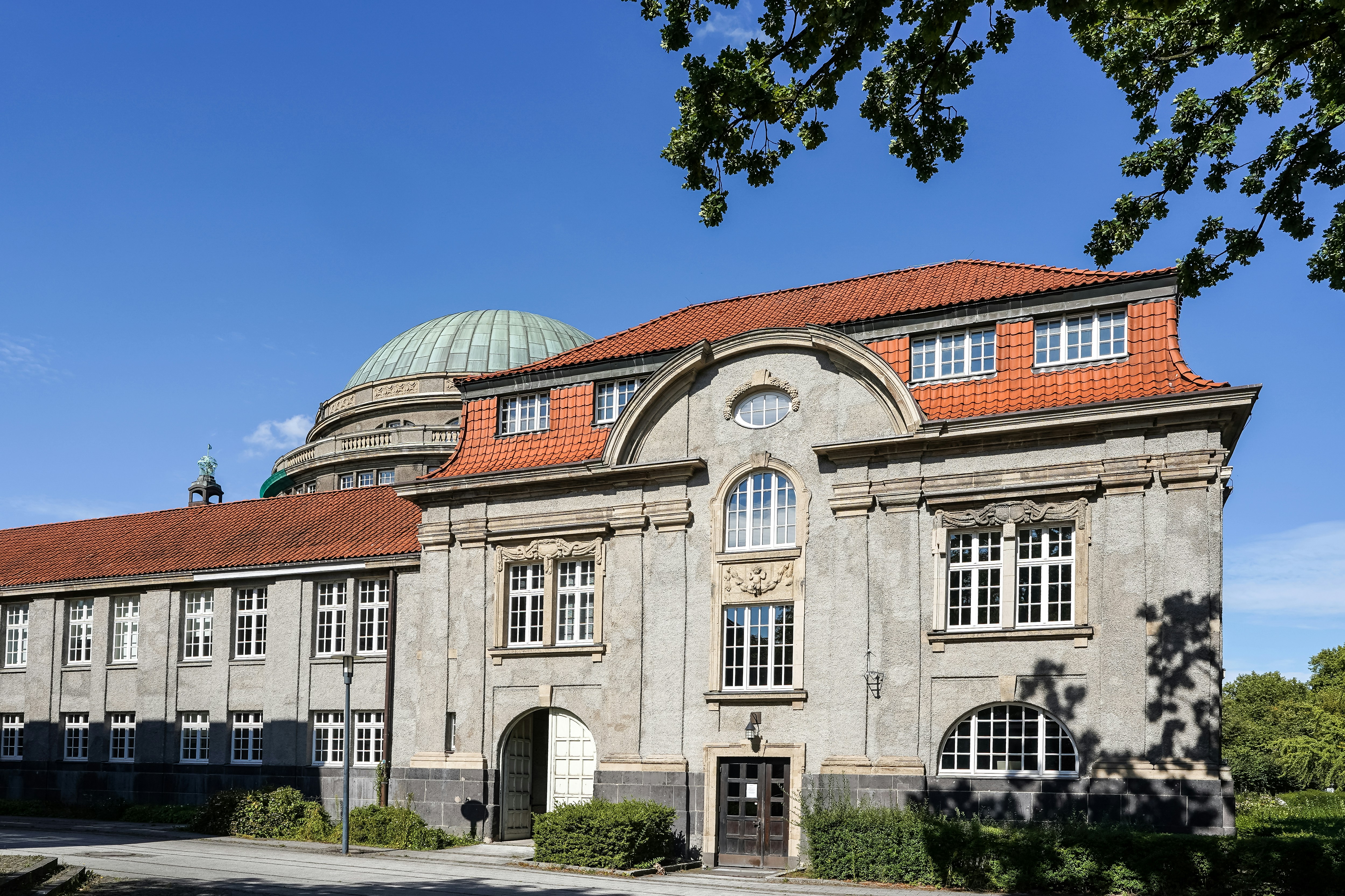 Ornate University Facade Under a Clear Blue Sky