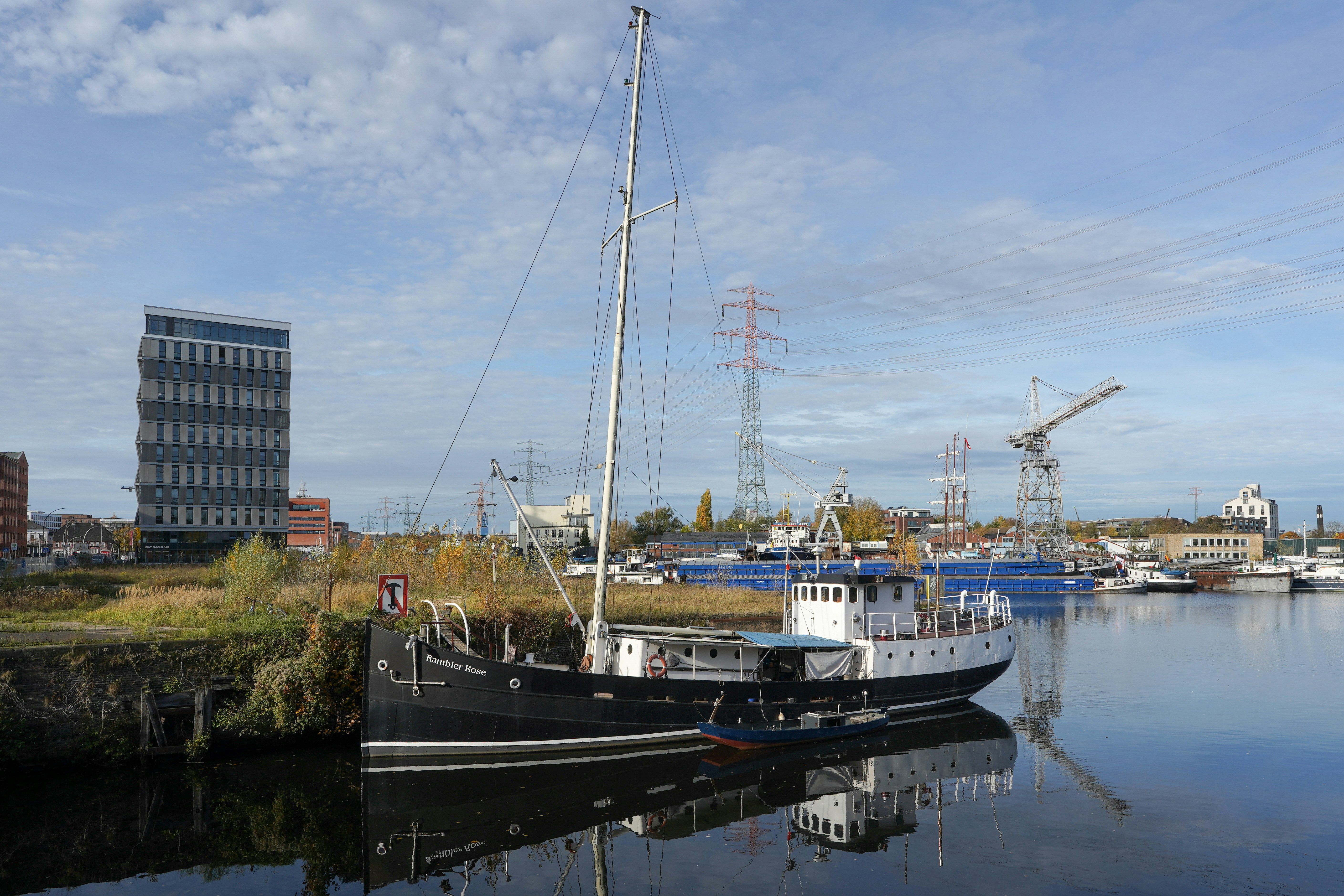 Black-Hull Vessel at the Quiet Thames-Style Dock