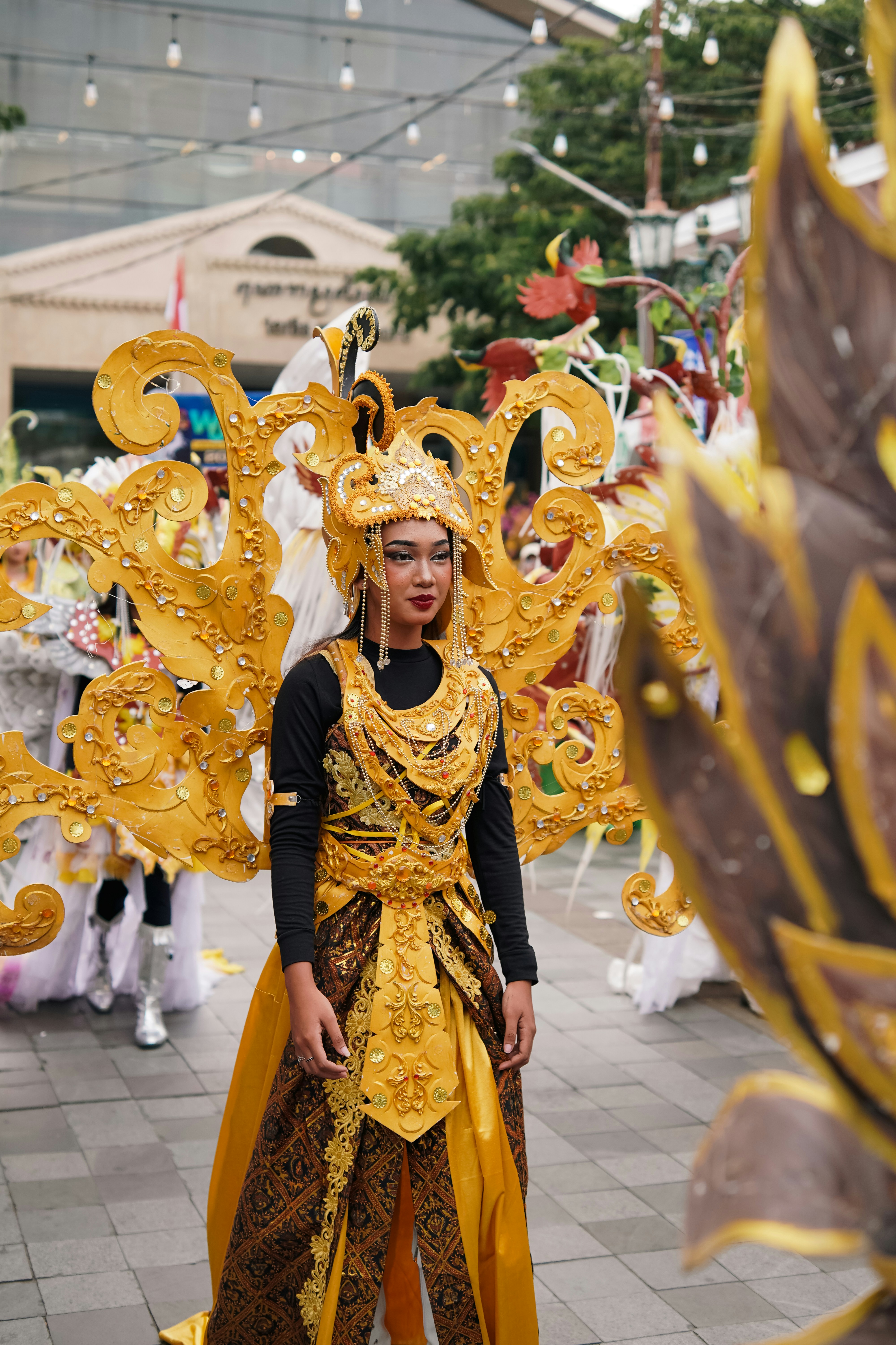 Golden Regalia: Parade Queen in Ornate Attire