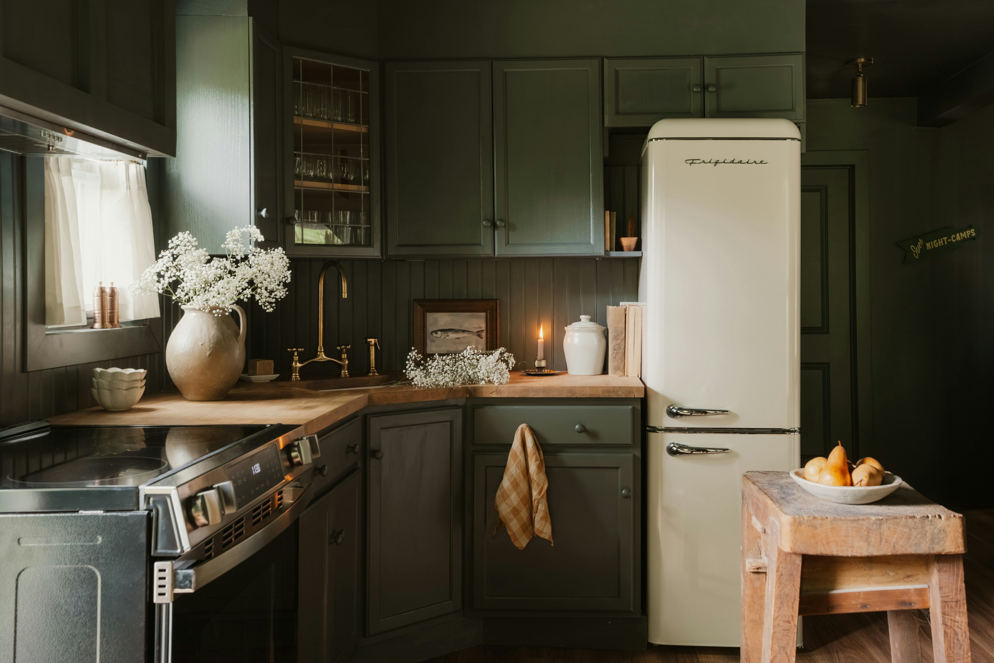 Midcentury Kitchen Calm: Olive Cabinets and Cream Fridge