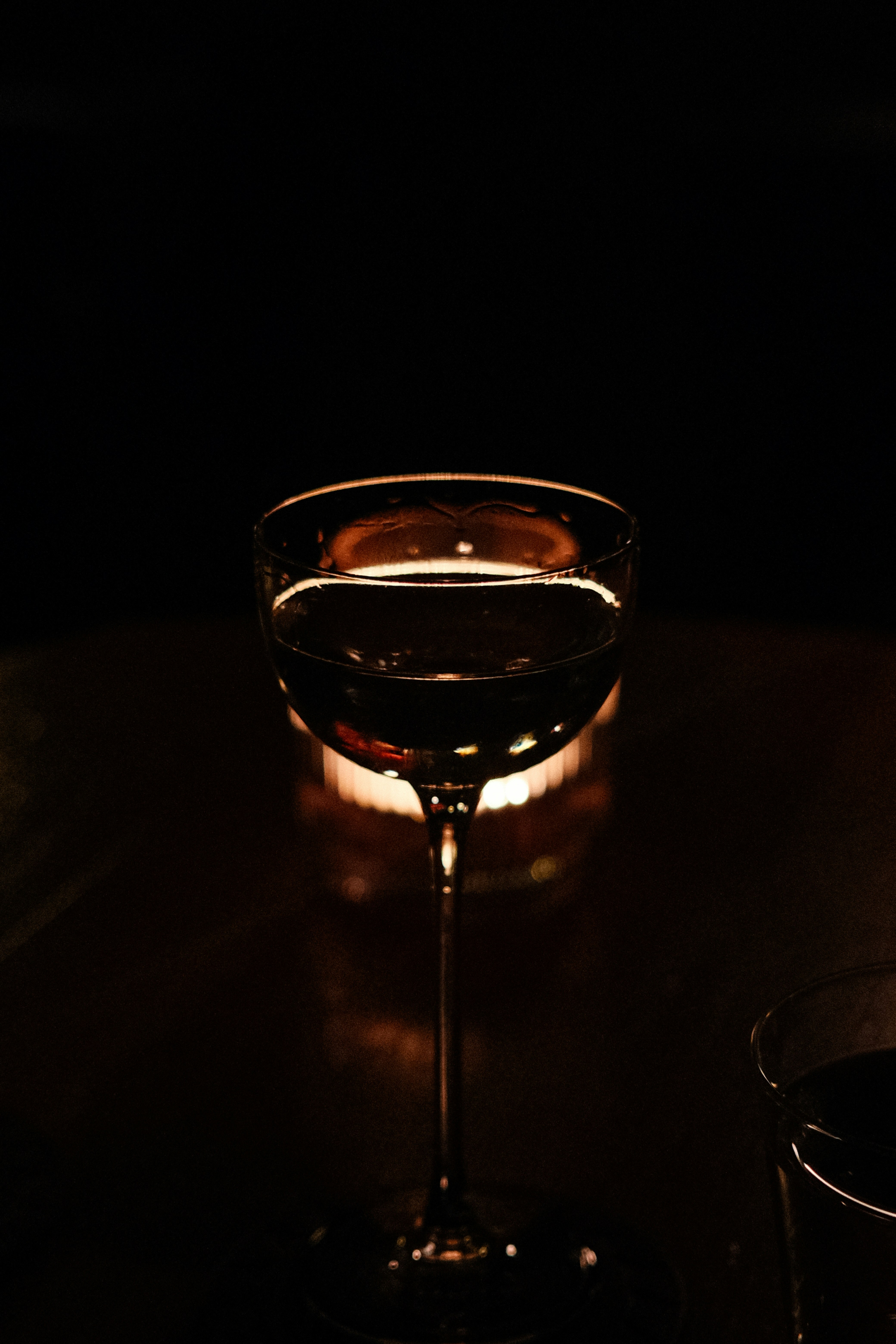 Wine Glass in Velvet Darkness