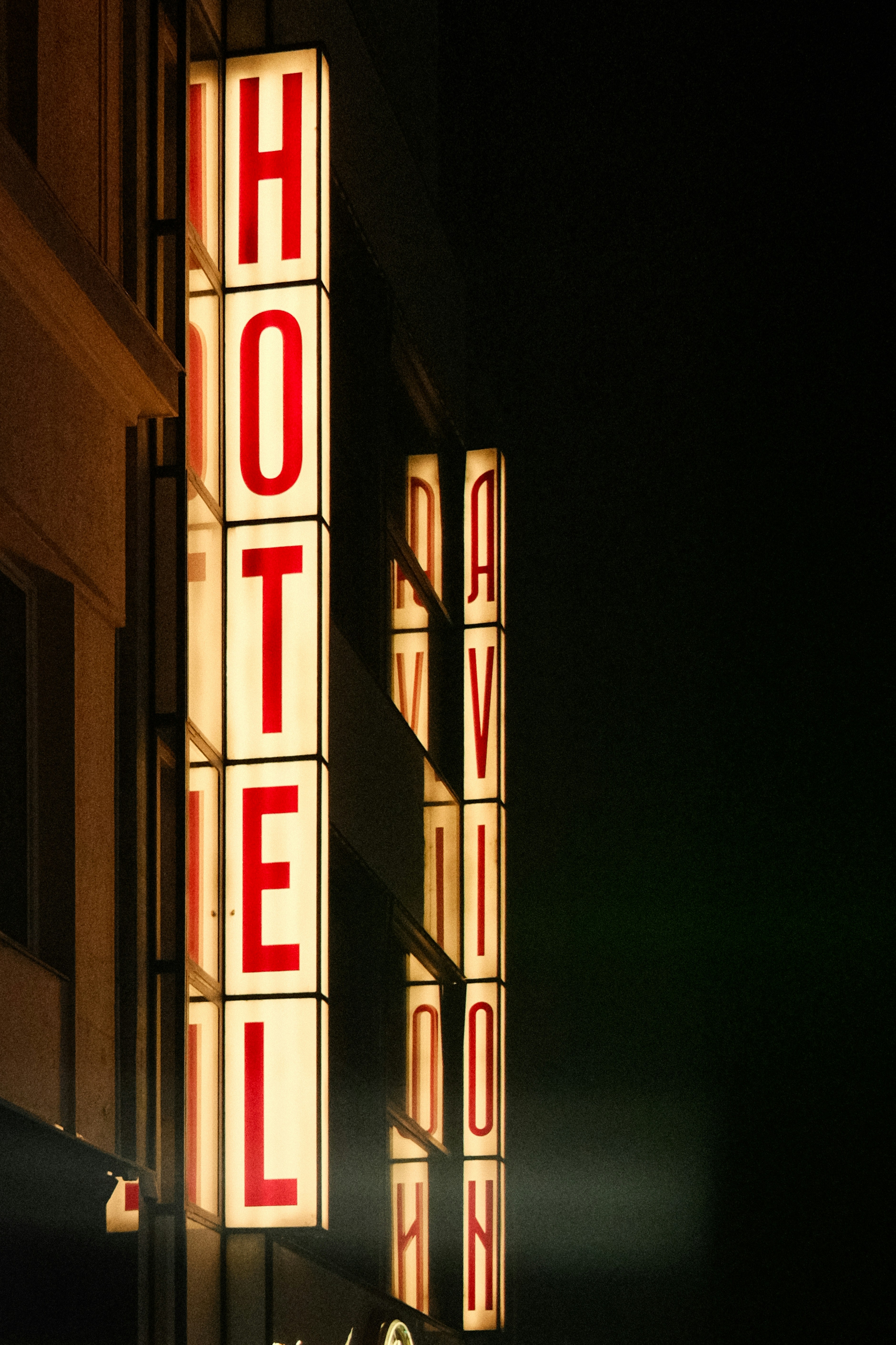 Neon Hotel Sign Cascade After Dark