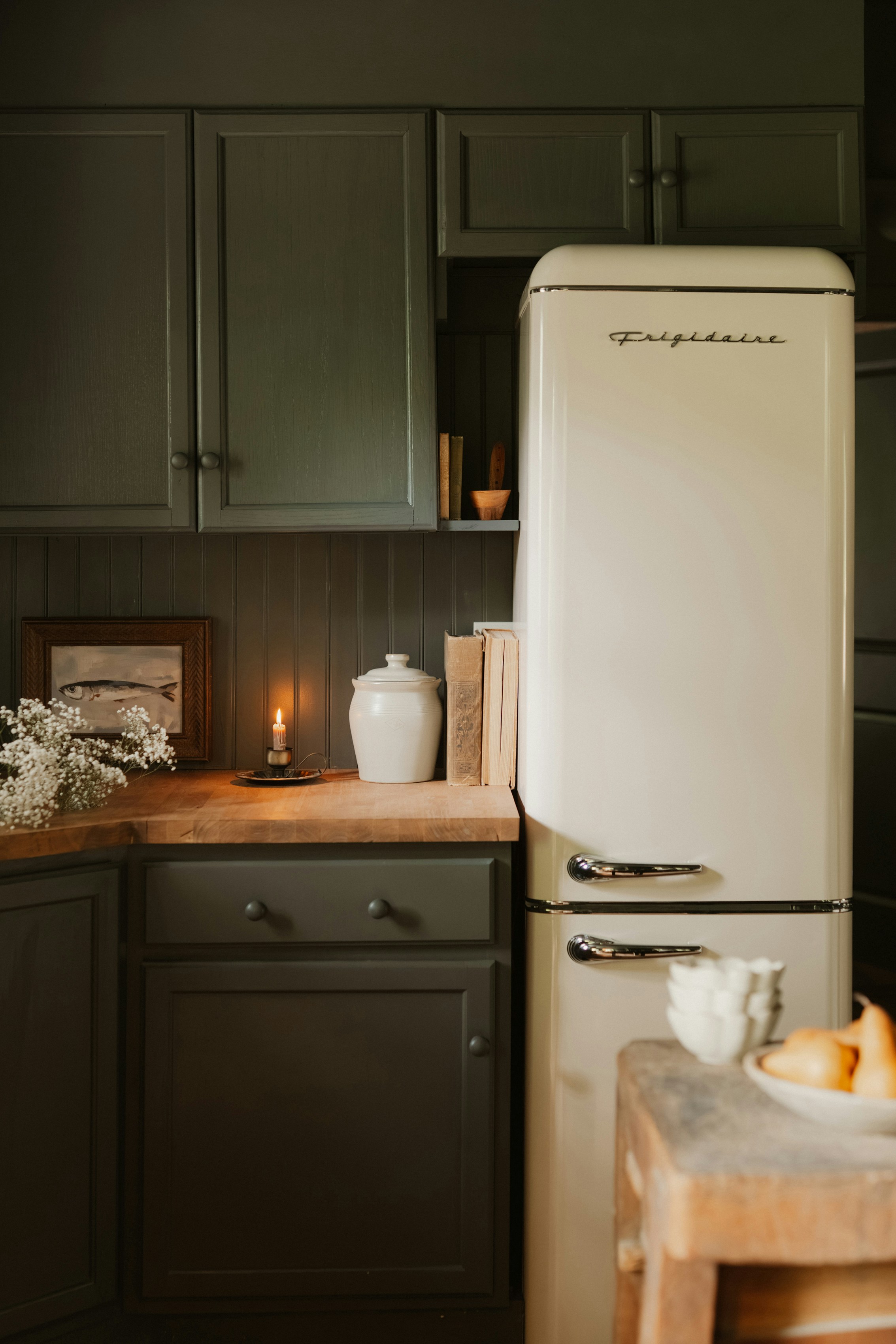 Creamy Retro Fridge Hideaway in a Quiet Kitchen
