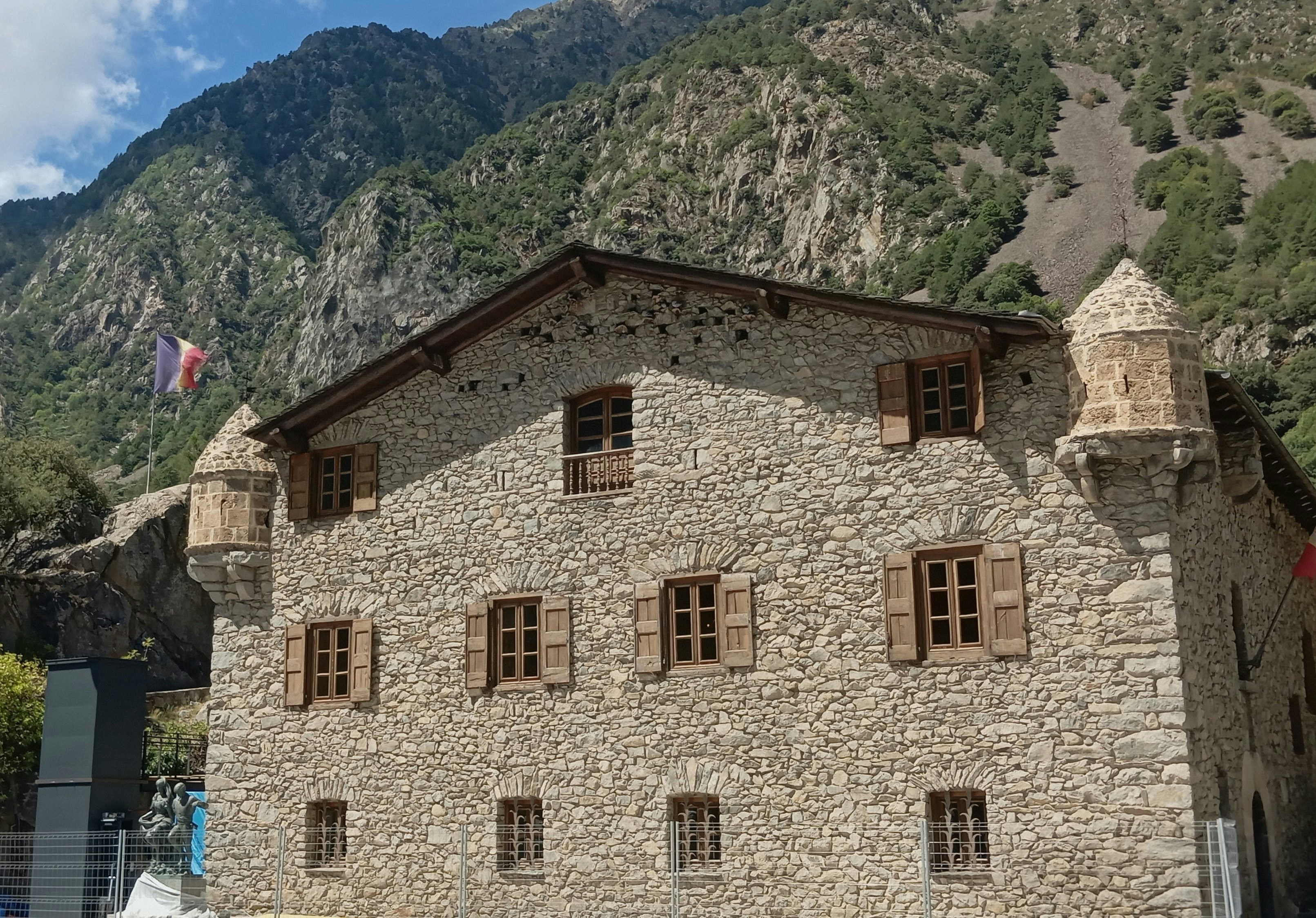Stone House Under Alpine Peaks