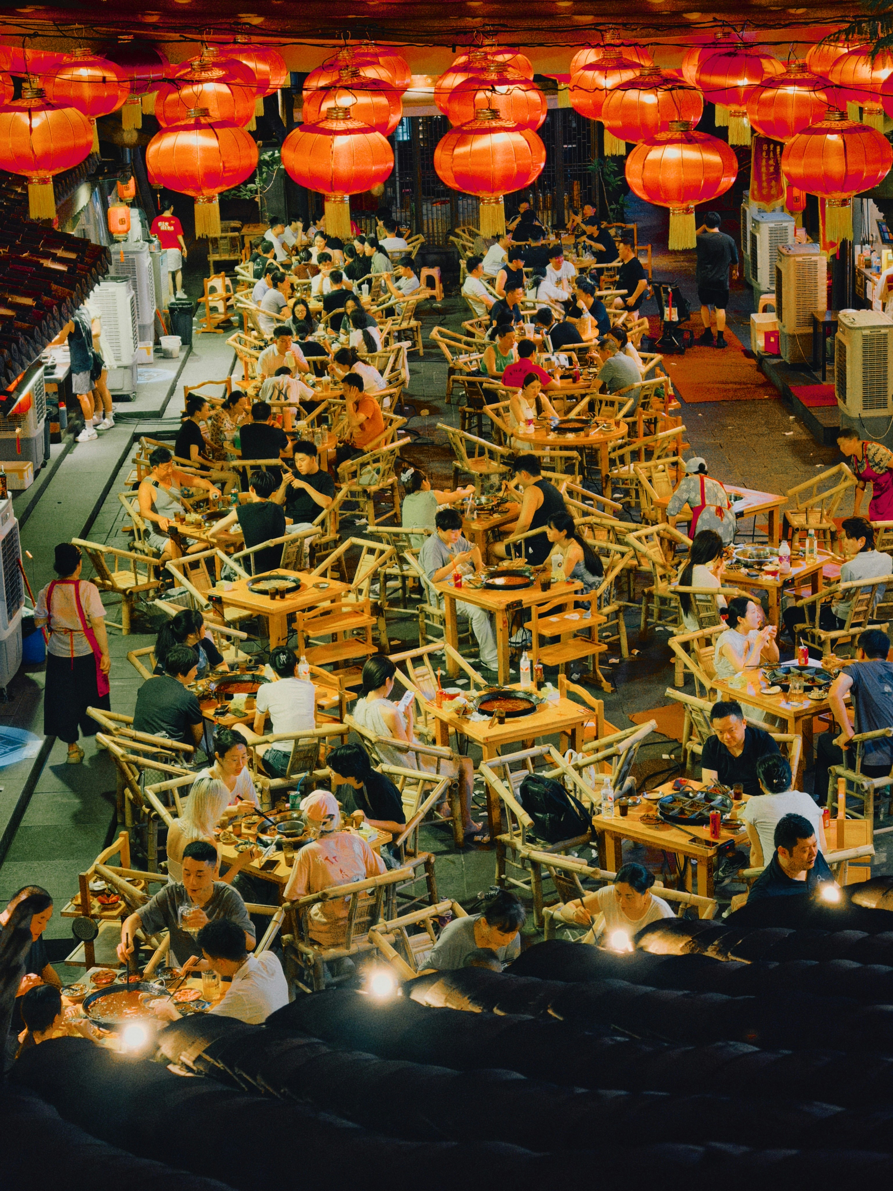 Lantern-lit Feast: Aerial Tapestry of Tabletop Life