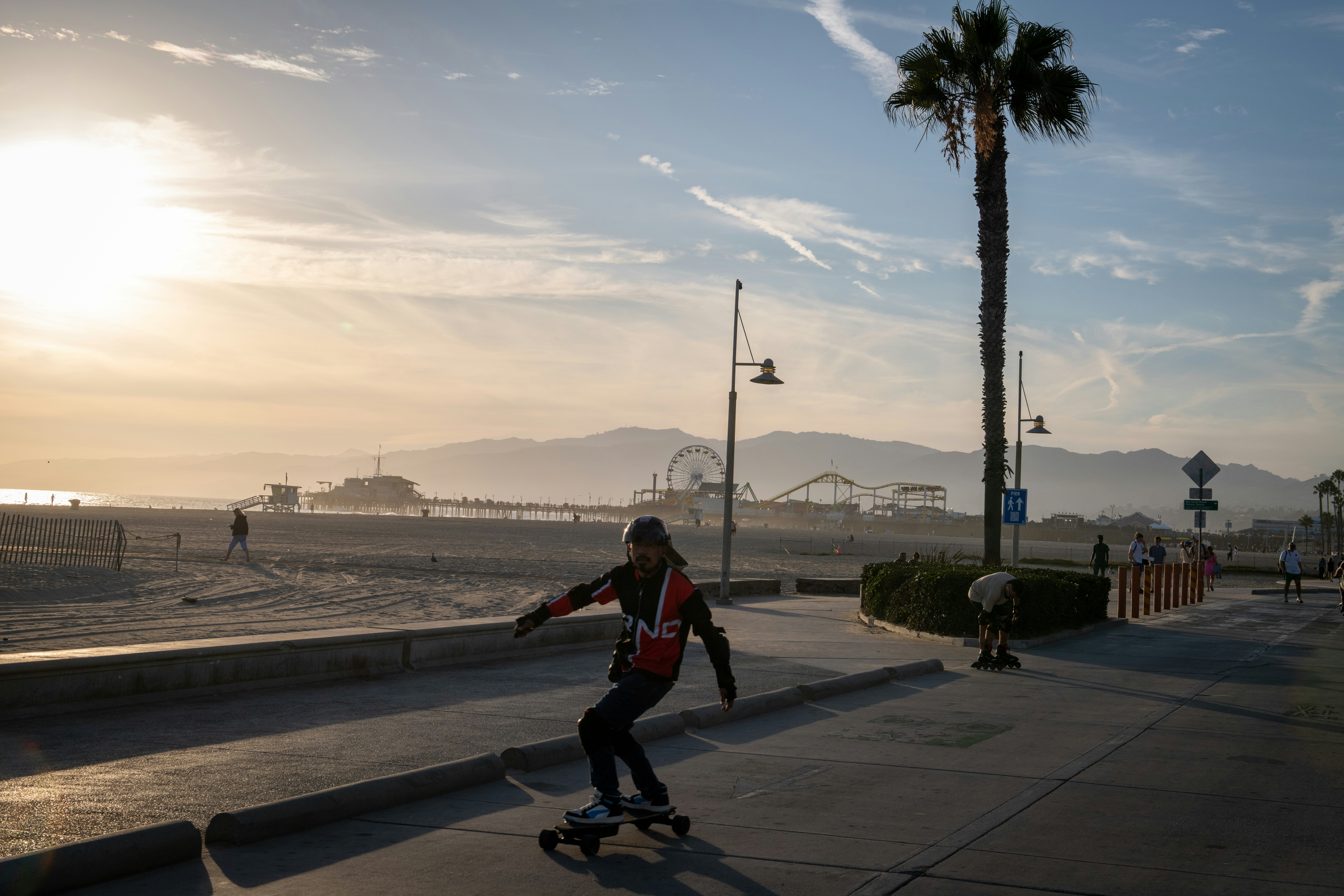 Lone Skater at Sunset Pier