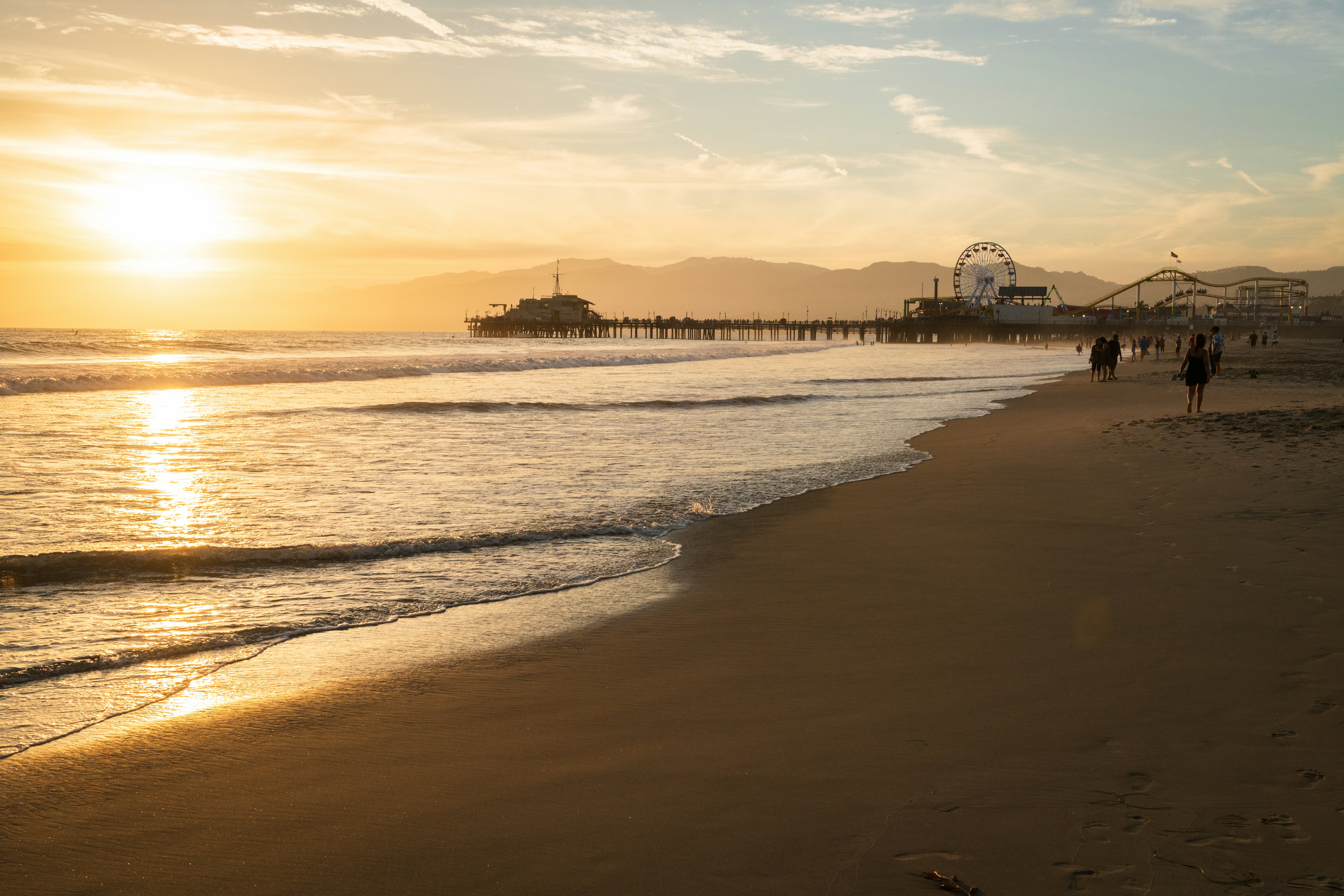 Golden Pier: Sunset Stroll Along a Calm Shore