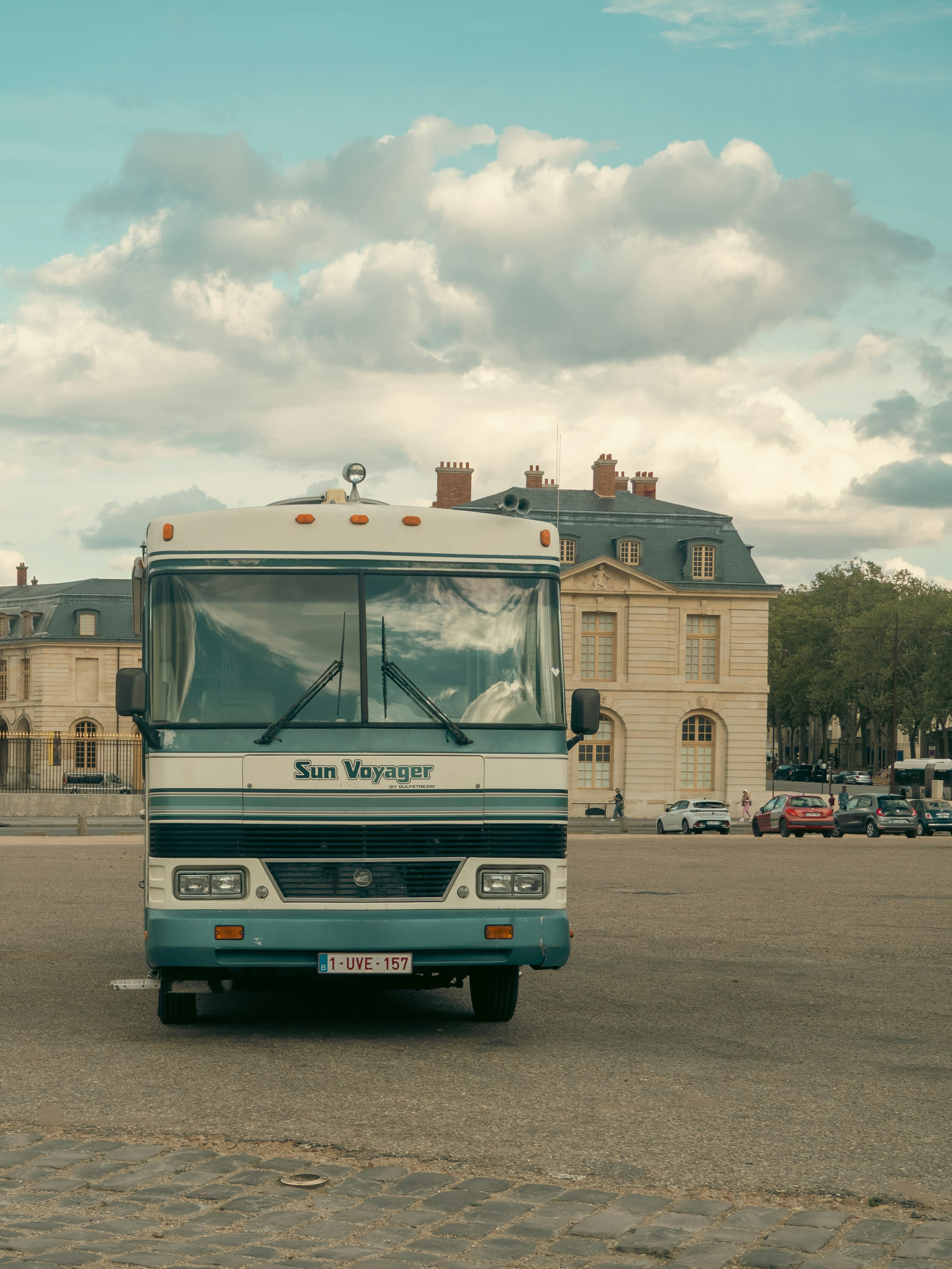 Sun Voyager Bus in a Quiet Square
