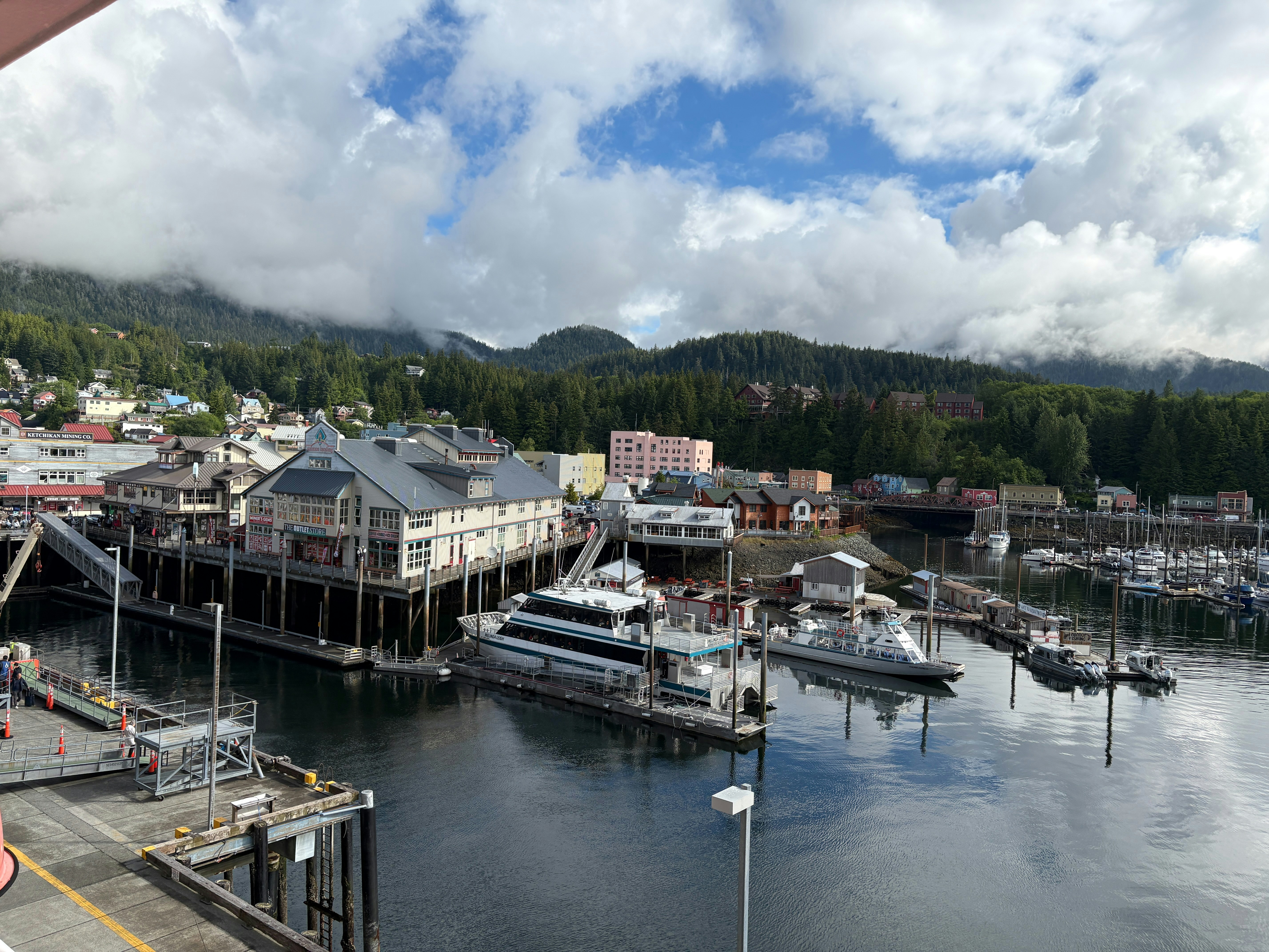 Harbor Town at Dusk: Boats, Stairs, and Mountain Mists