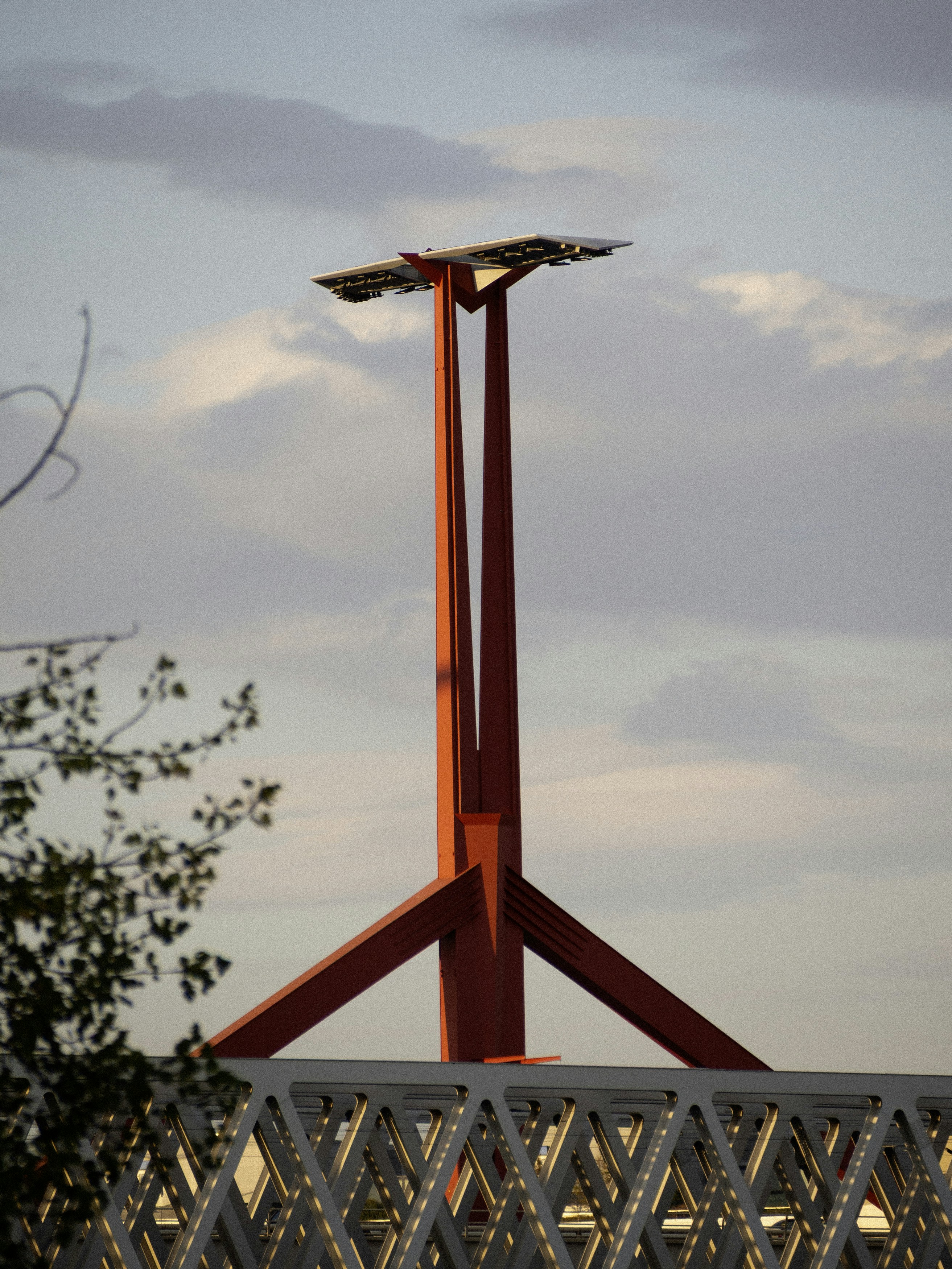Red Skyline Tower: A Ferro-Structural Sunrise