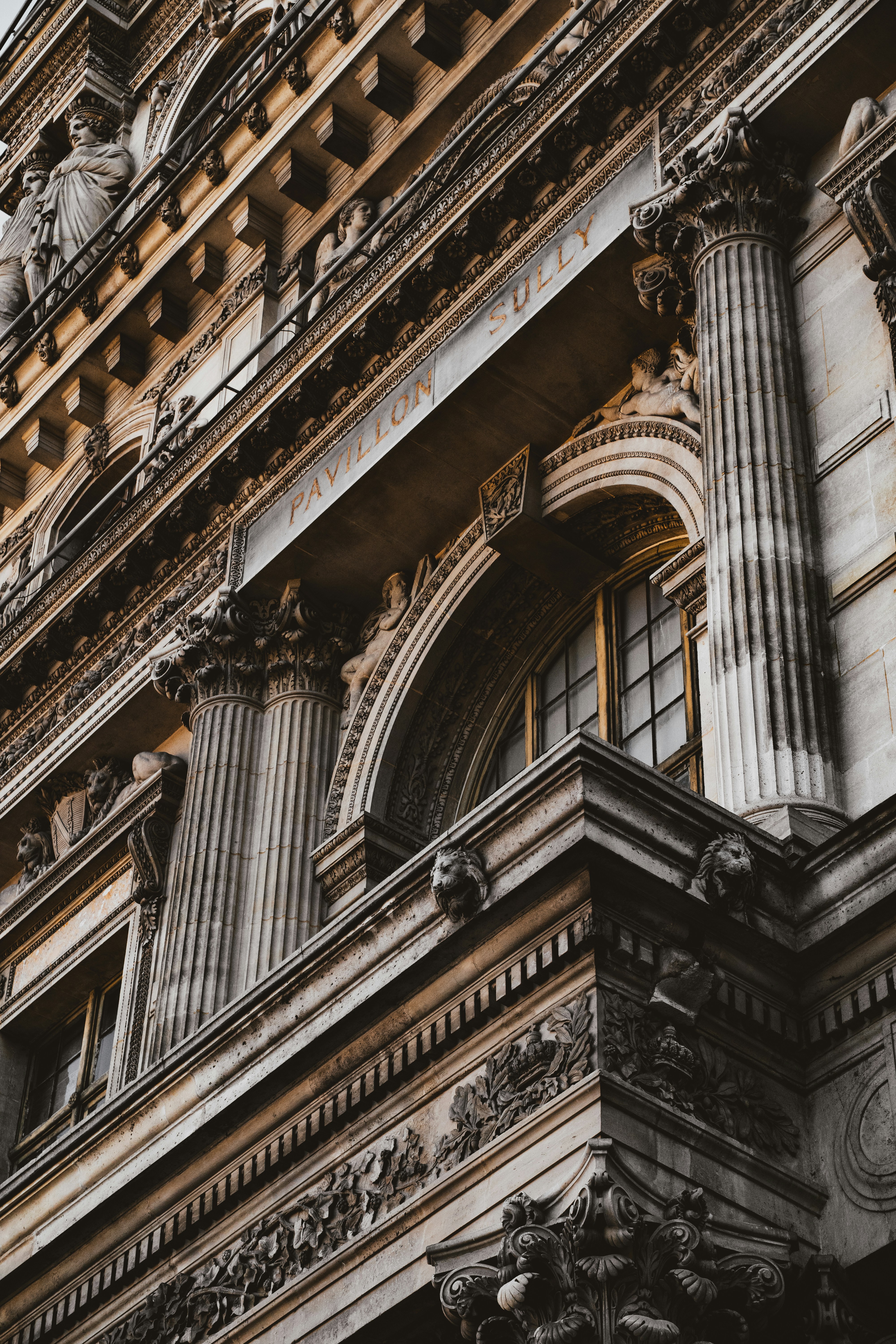 Stone Echoes: Ornate Carvings Gracing a Monumental Facade
