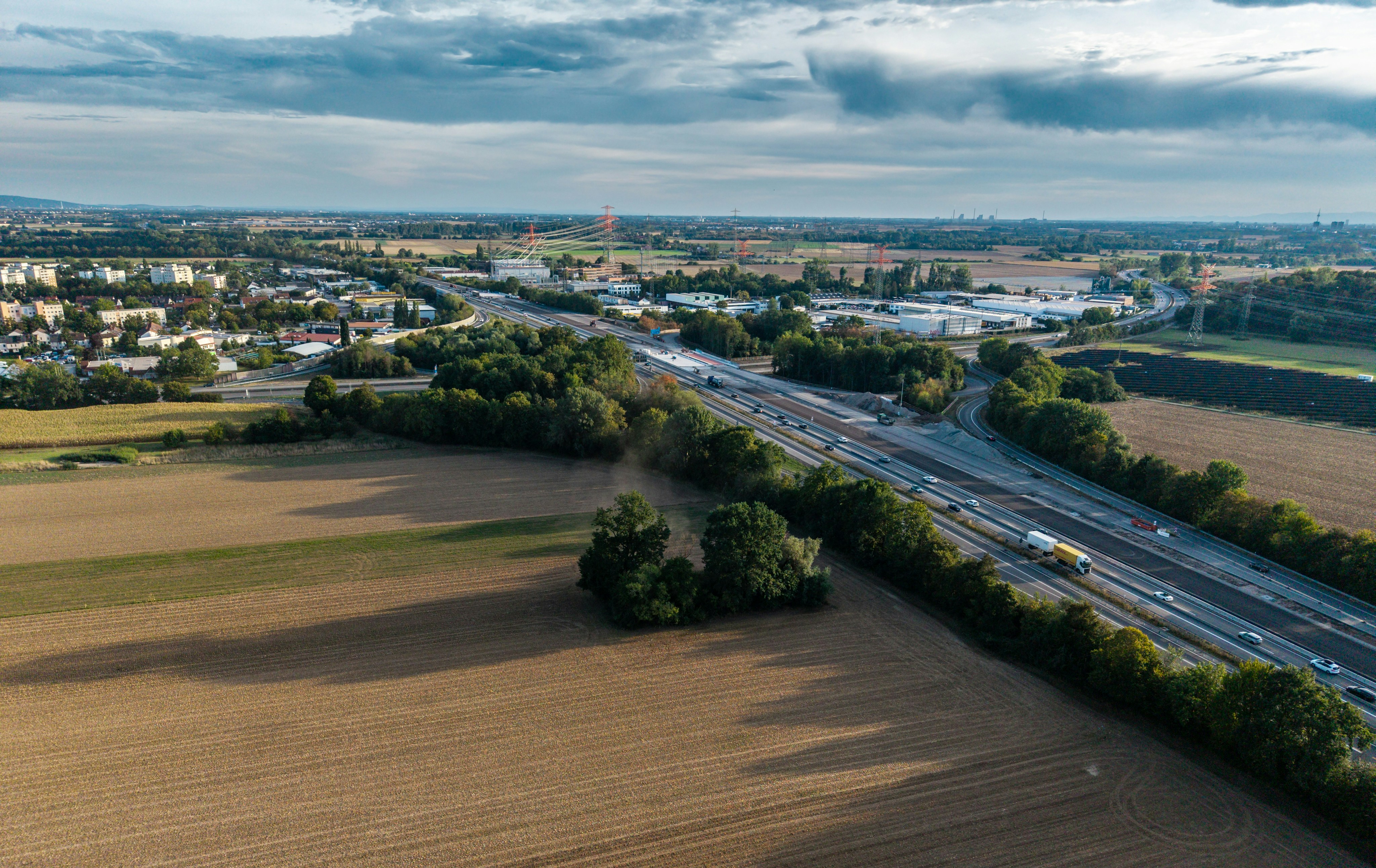 Overpass Echoes: Field and Highway Confluence from Above