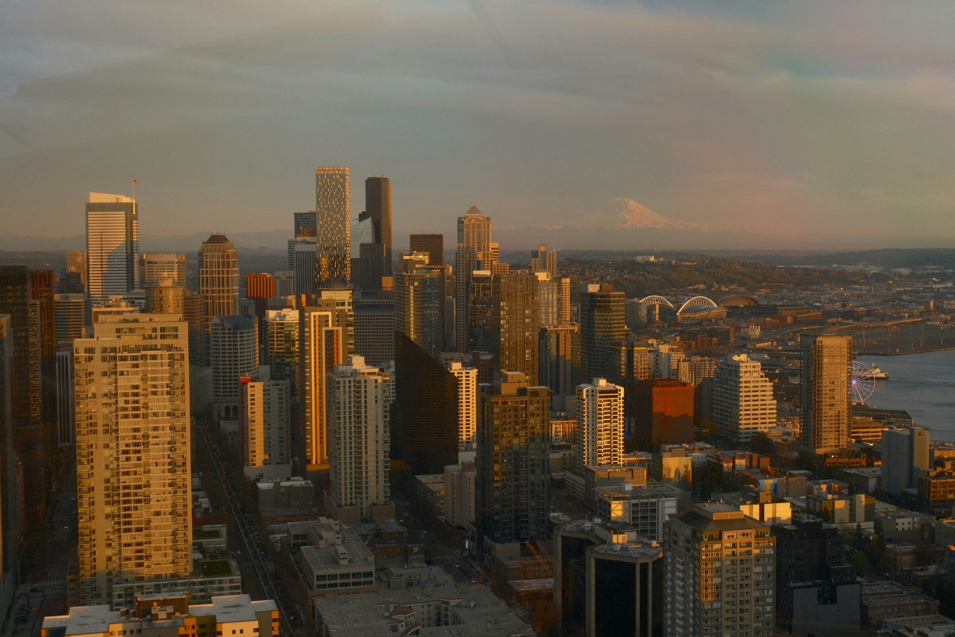Golden Hour Skyline: City Grid Alight with Warm Light