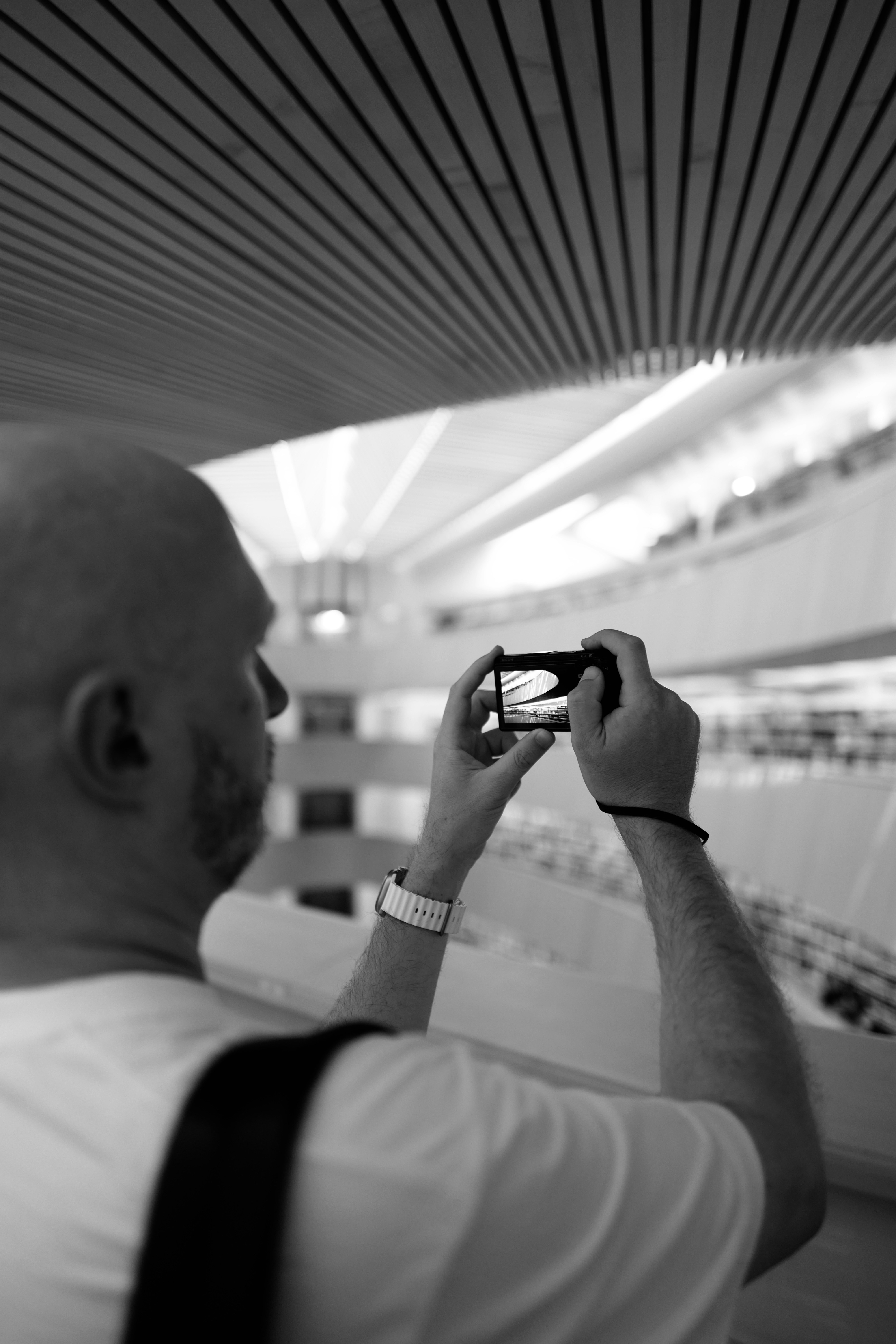 Portrait of a Moment: Capturing a Selfie Against Modern Architecture