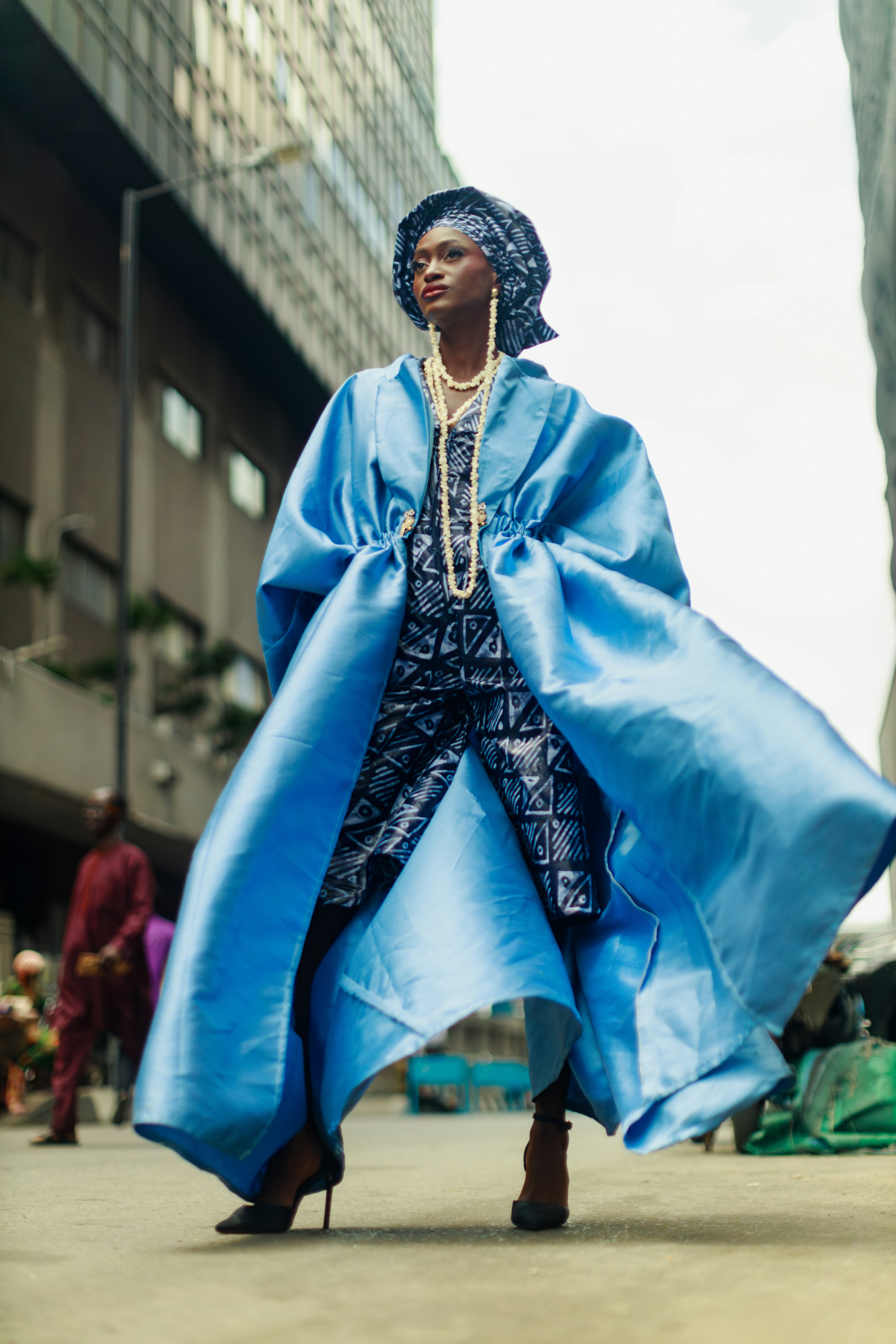 Blue Mosaic: A Stride Through the City in Flowing Indigo